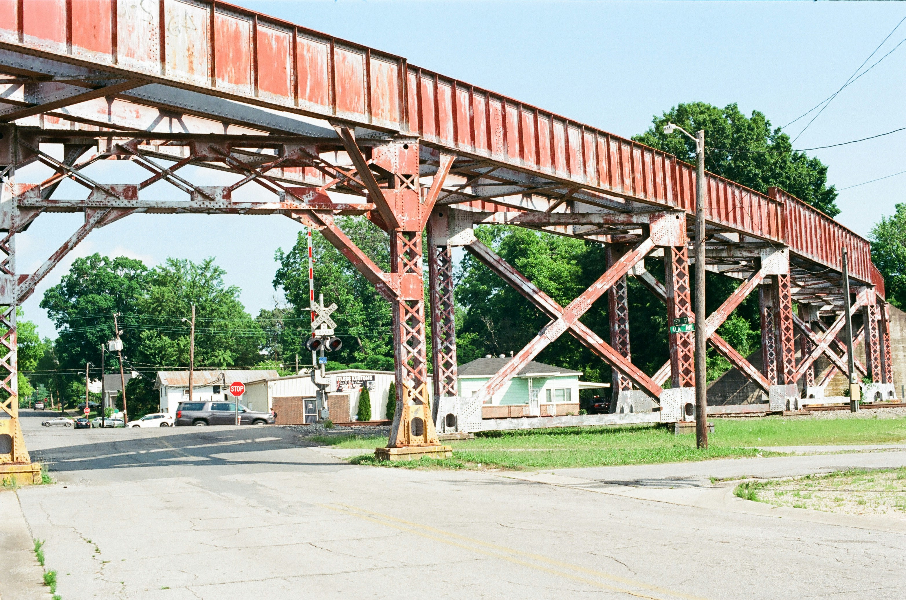 Rusty Steel Span Over an Open Street