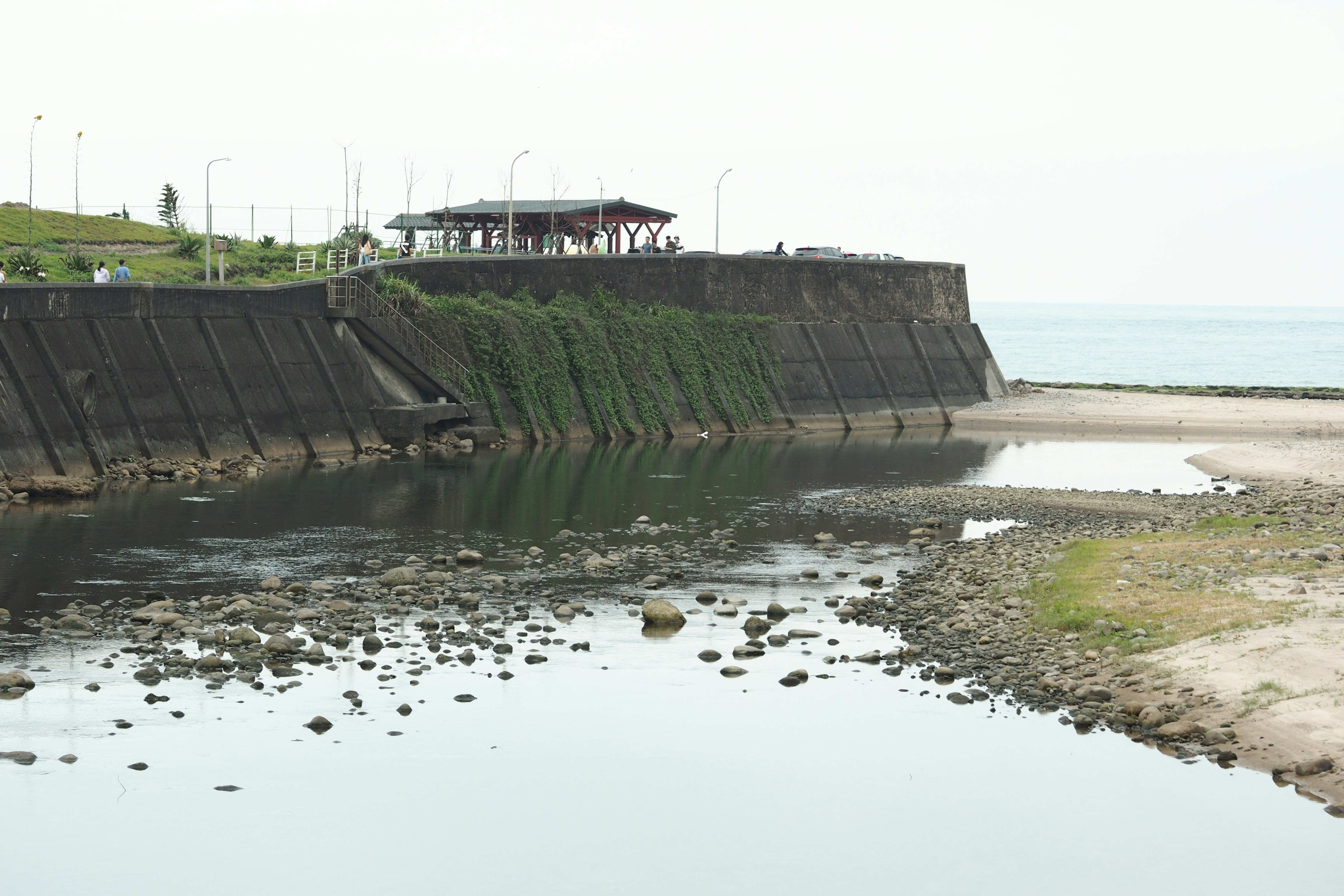 Seaside Terrace Overlooking a Quiet Breakwater