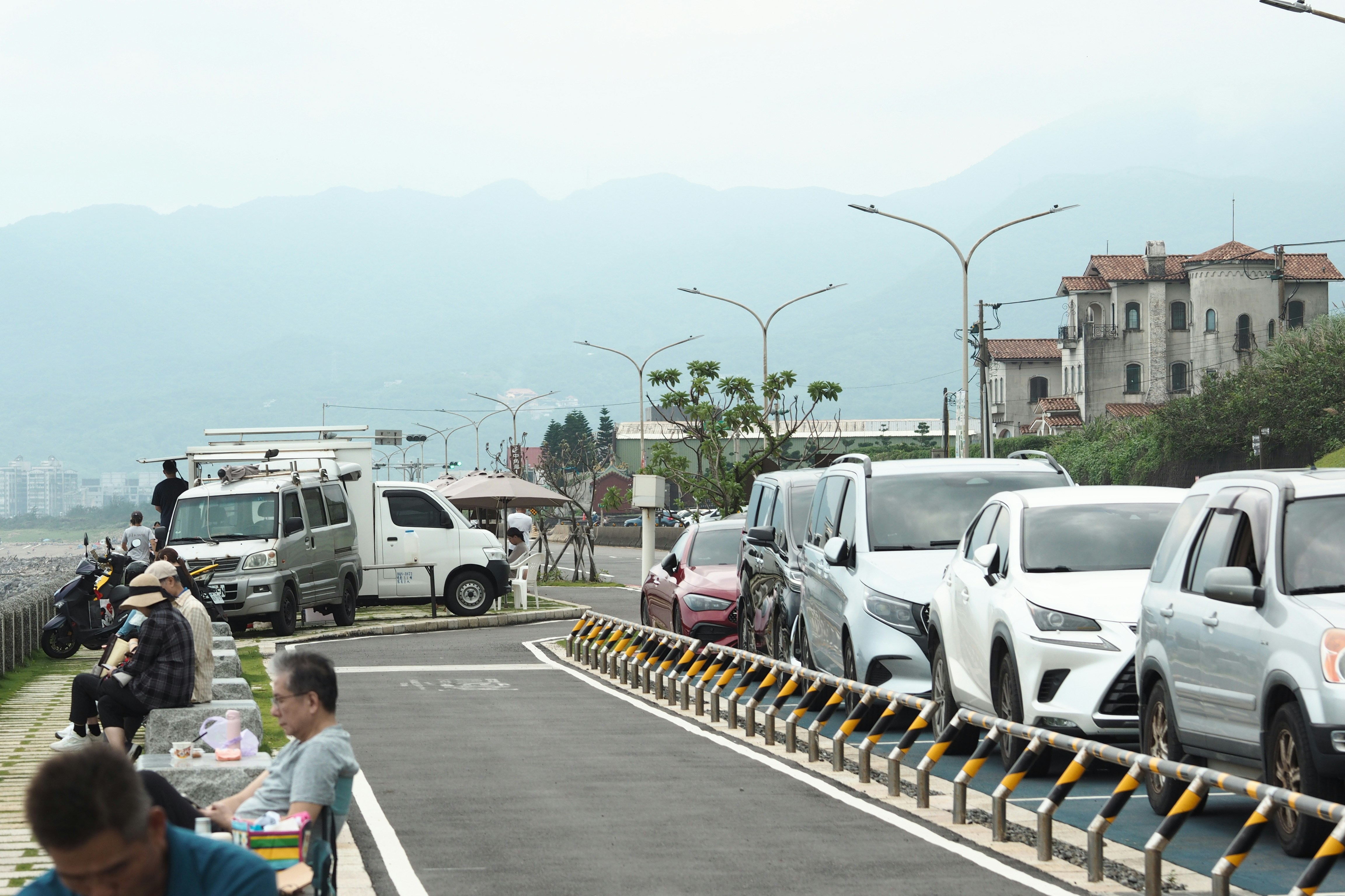 Seaside Promenade Parking and Busy Waterfront Lane