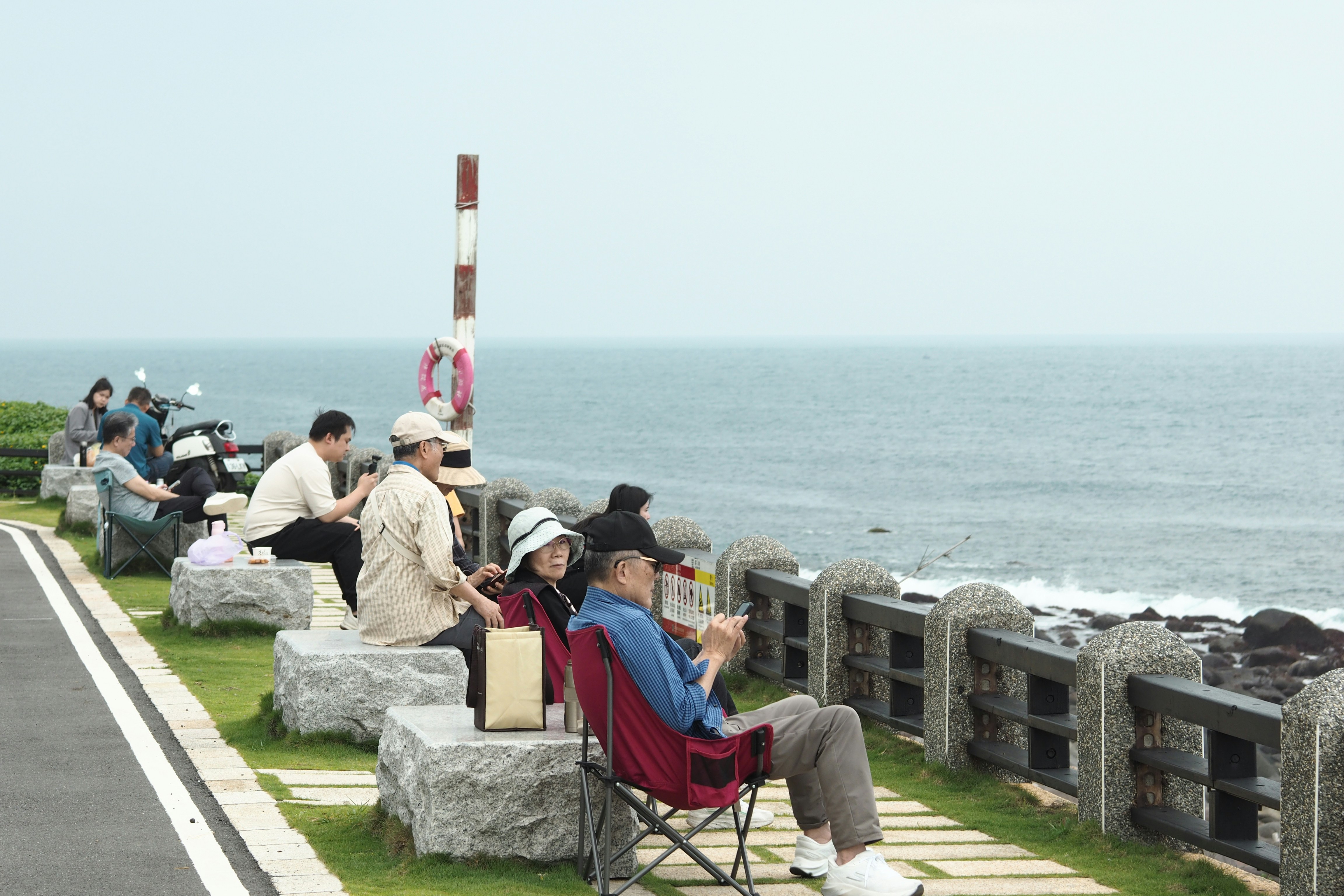Coastal Bench Daydreams: Leisure Along the Sea Wall