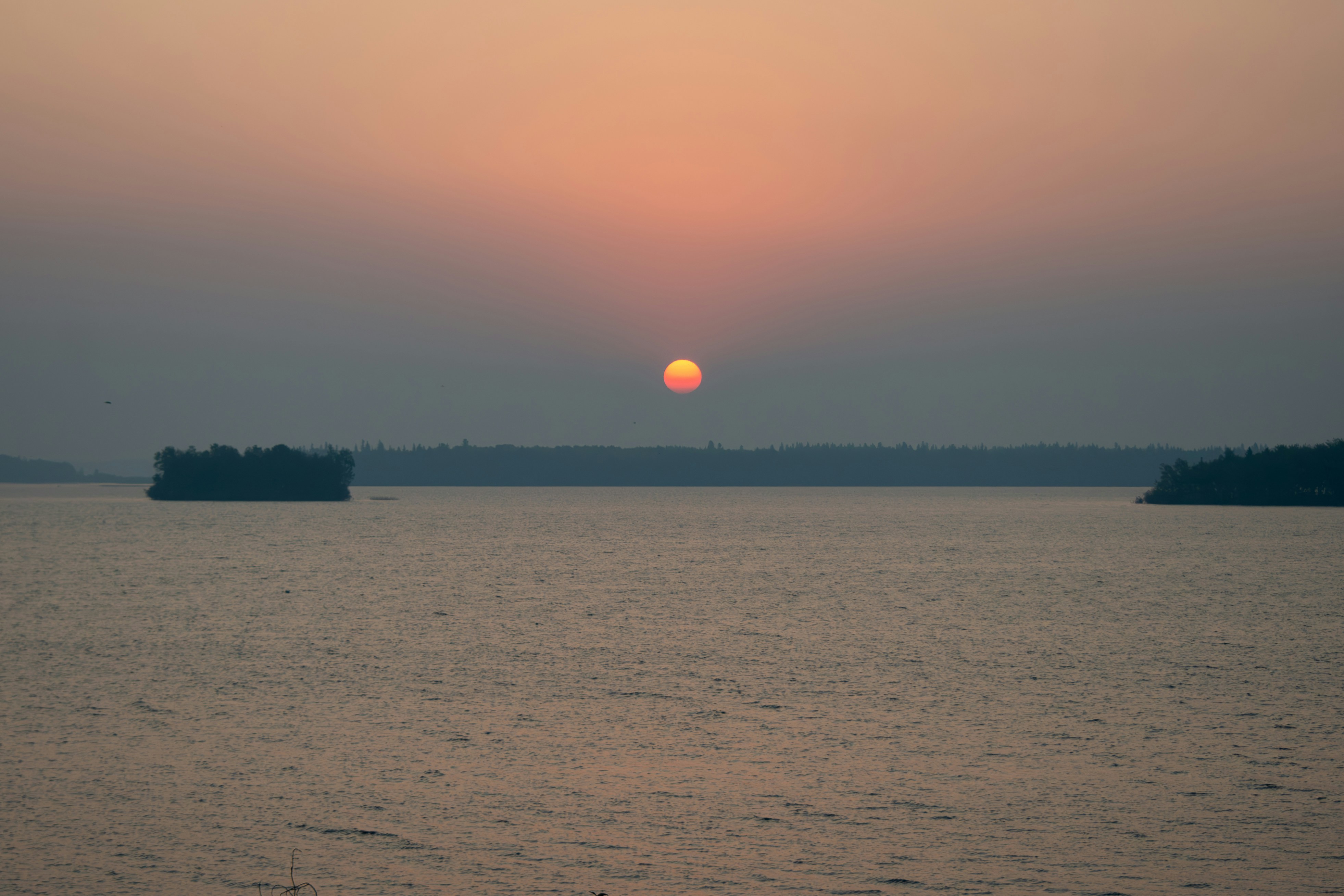 Sun-Kissed Horizon: Quiet Lake at Dusk