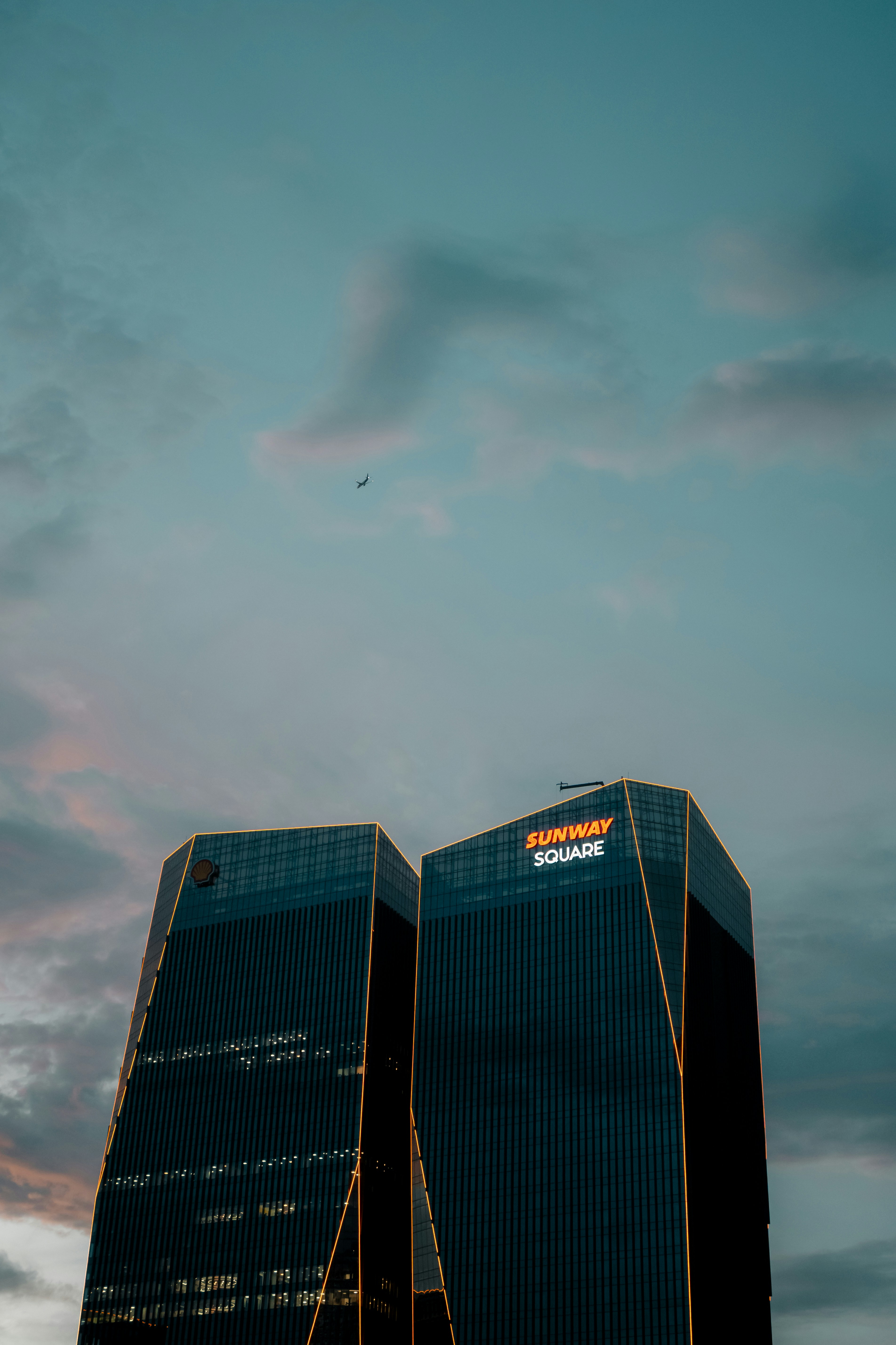 Sunway Square: Twin Towers Rising Under a Dusky Sky