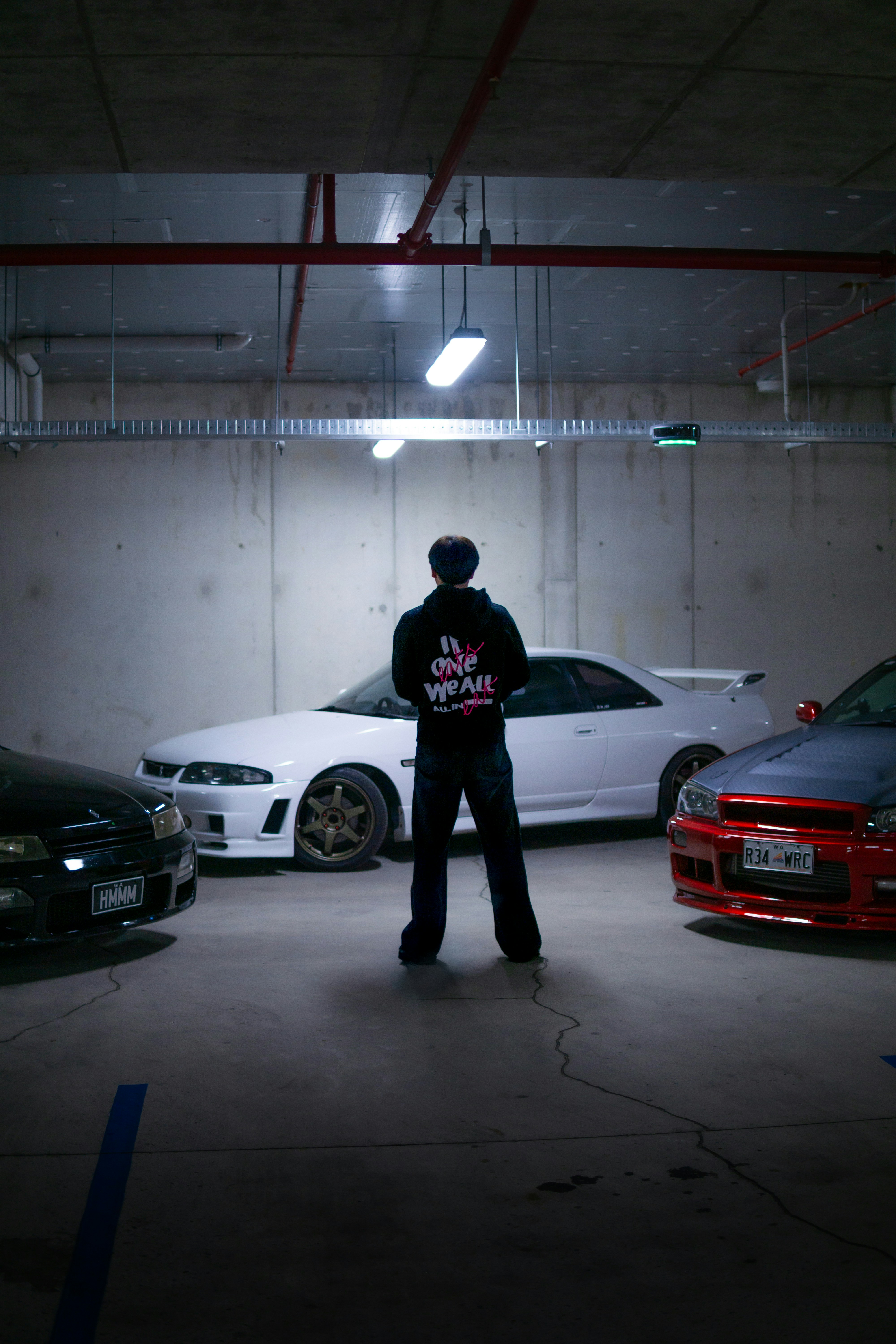 Standing Between Legends: Night in the Underground Car Loft