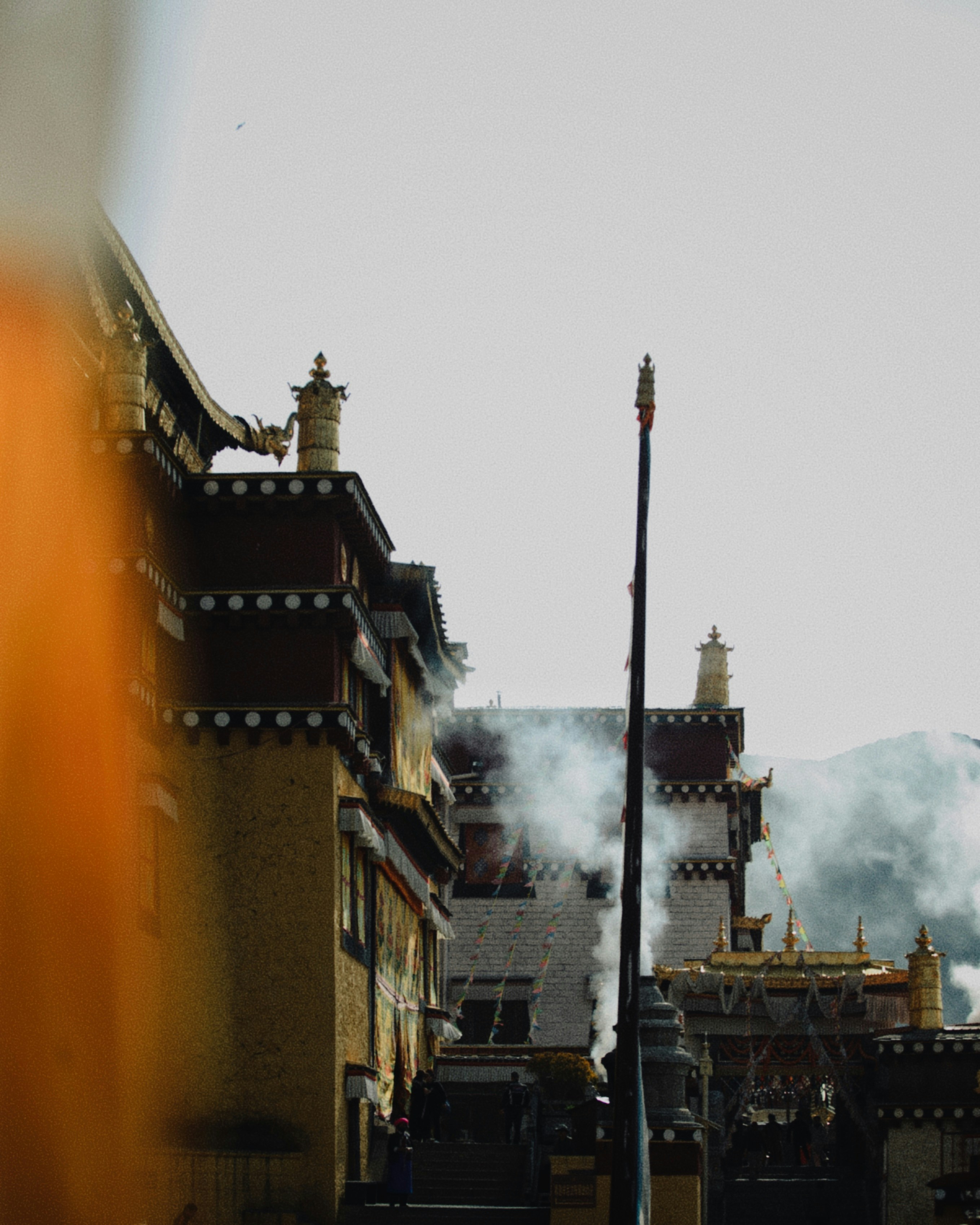 Temple Ridge: A Plume of Steam Amid Balinese Architecture