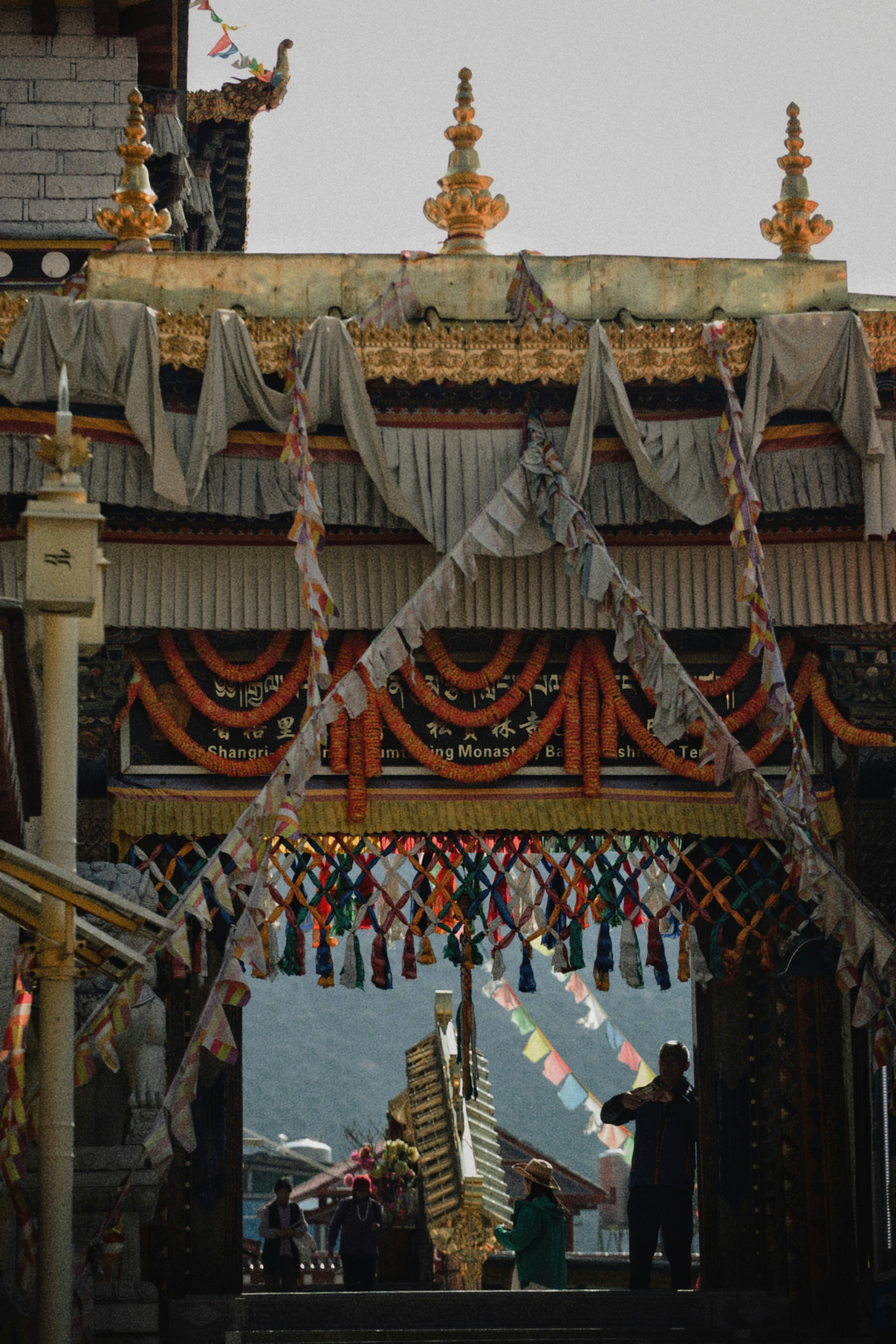 Gateway of Prayer: Shaded Courtyard to the Valley