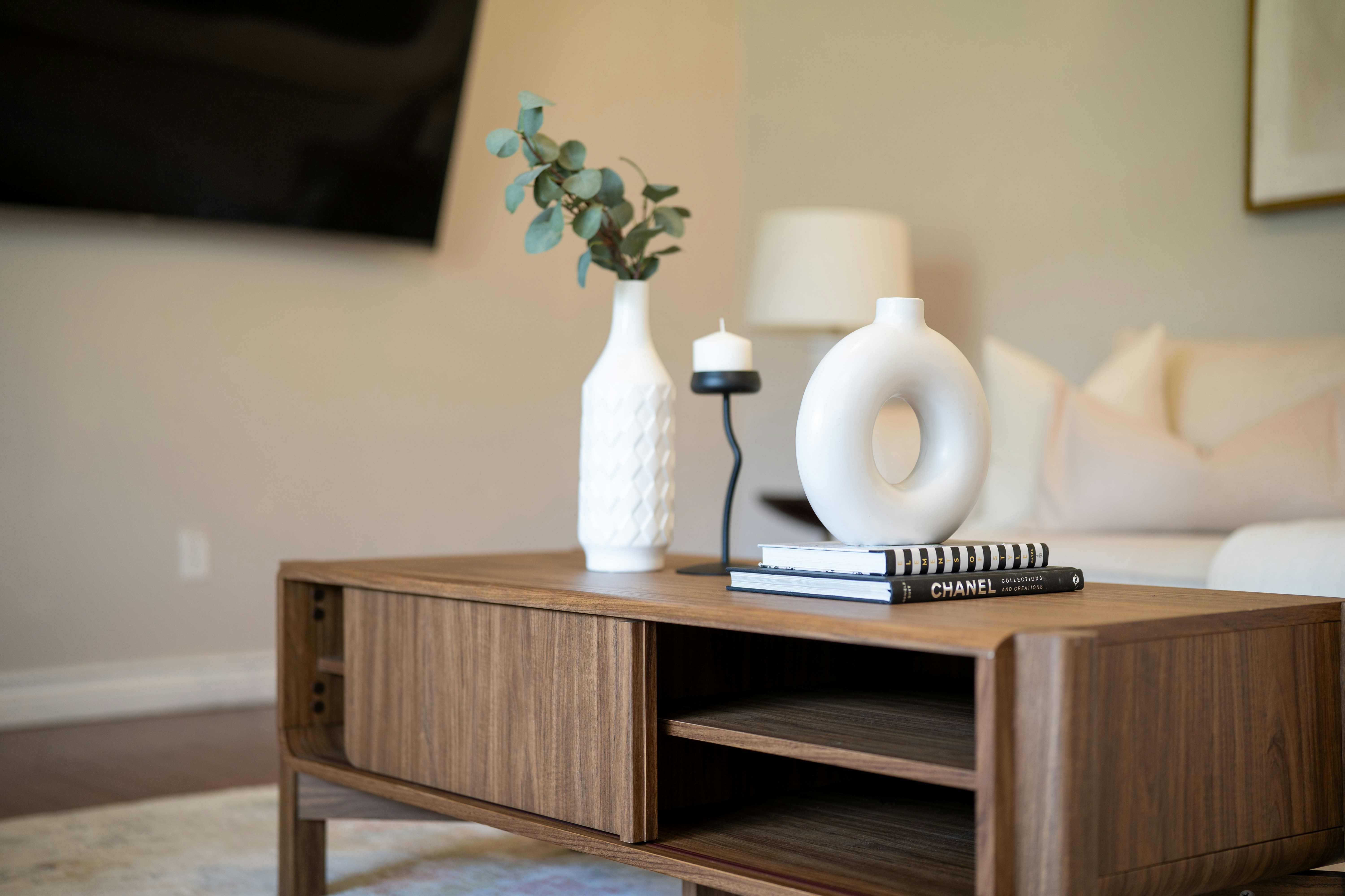 Minimalist living room coffee table with sculptural decor