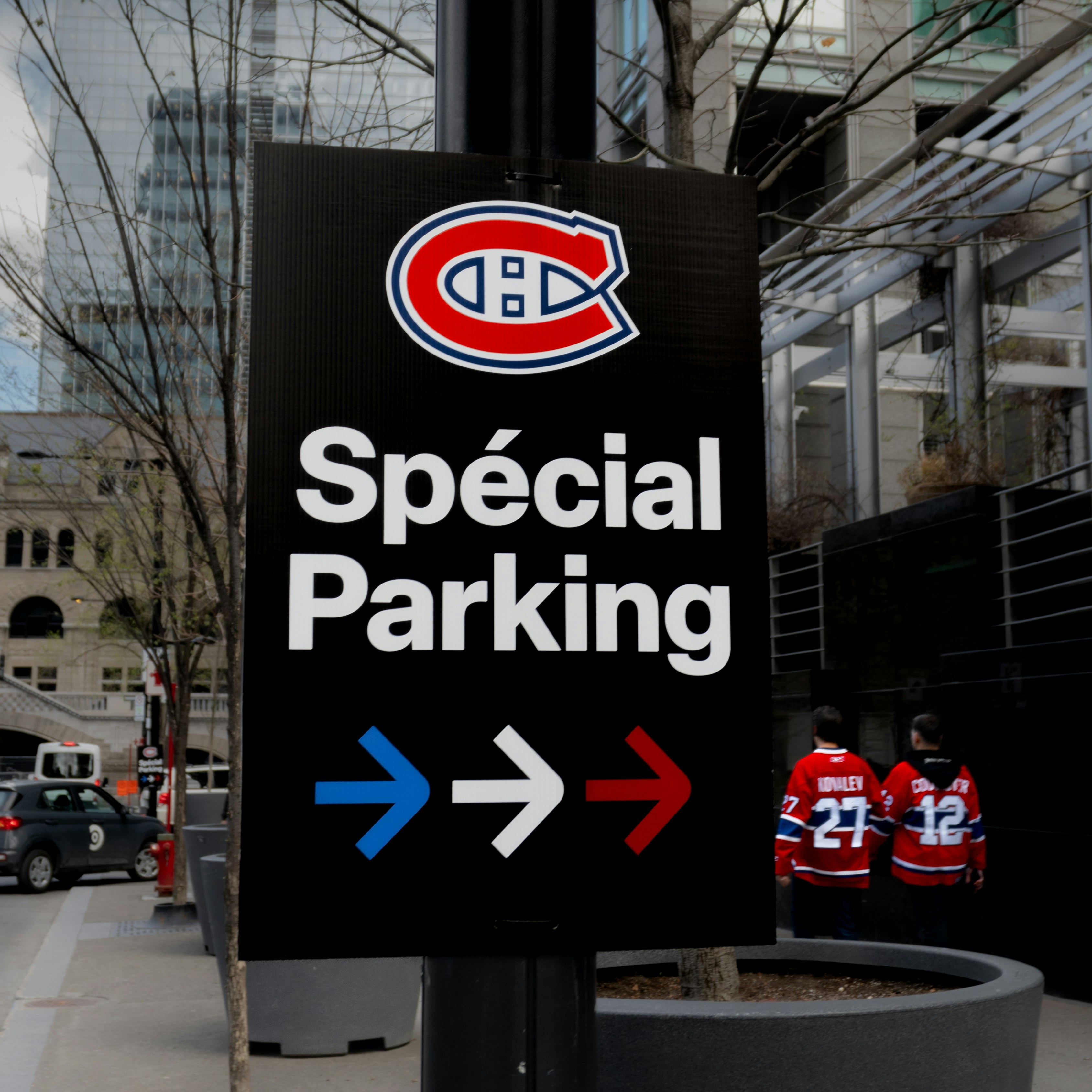 Special Parking Sign Amid Urban Activity