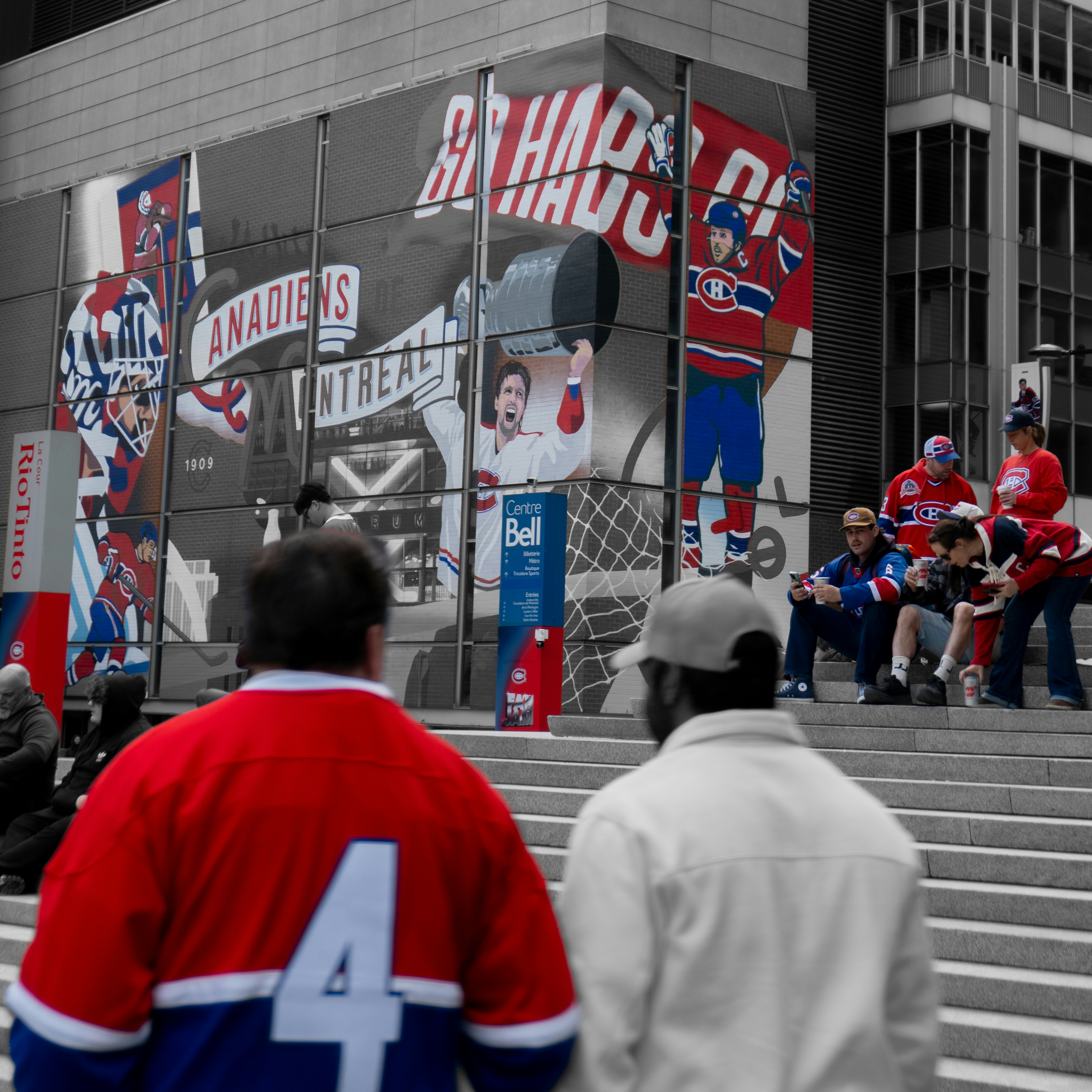 Fans in Red and Gray Rally at the Retro Hockey Wall