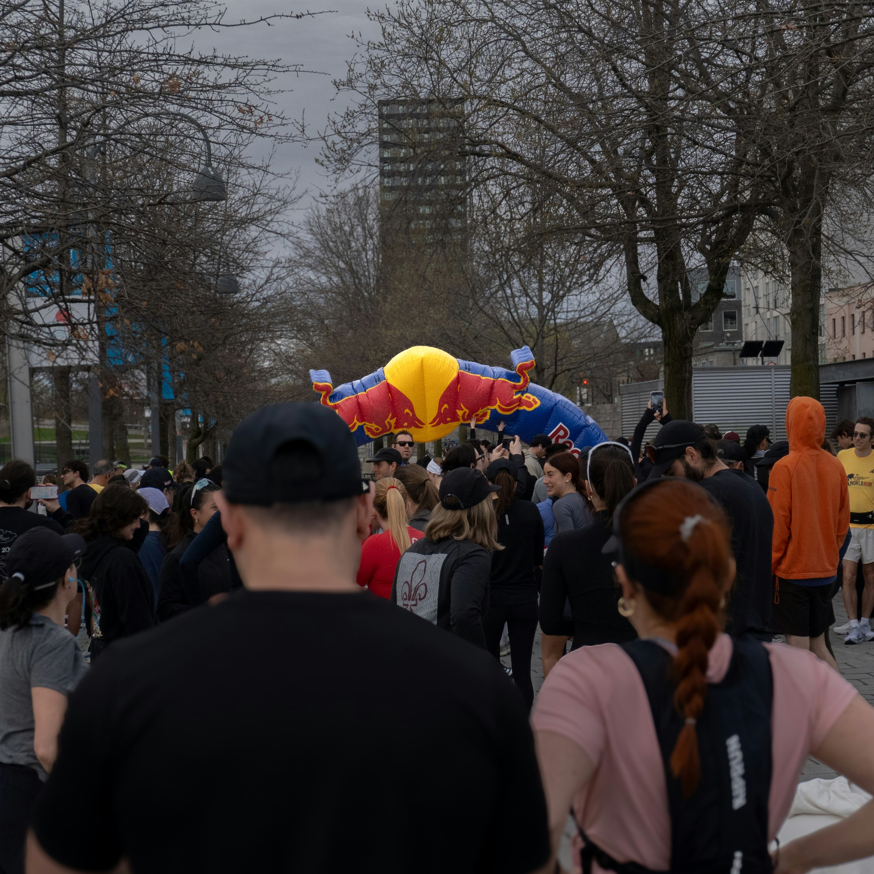 Midfield Moment: Crowd Converges on the Inflated Arch at Dusk Run