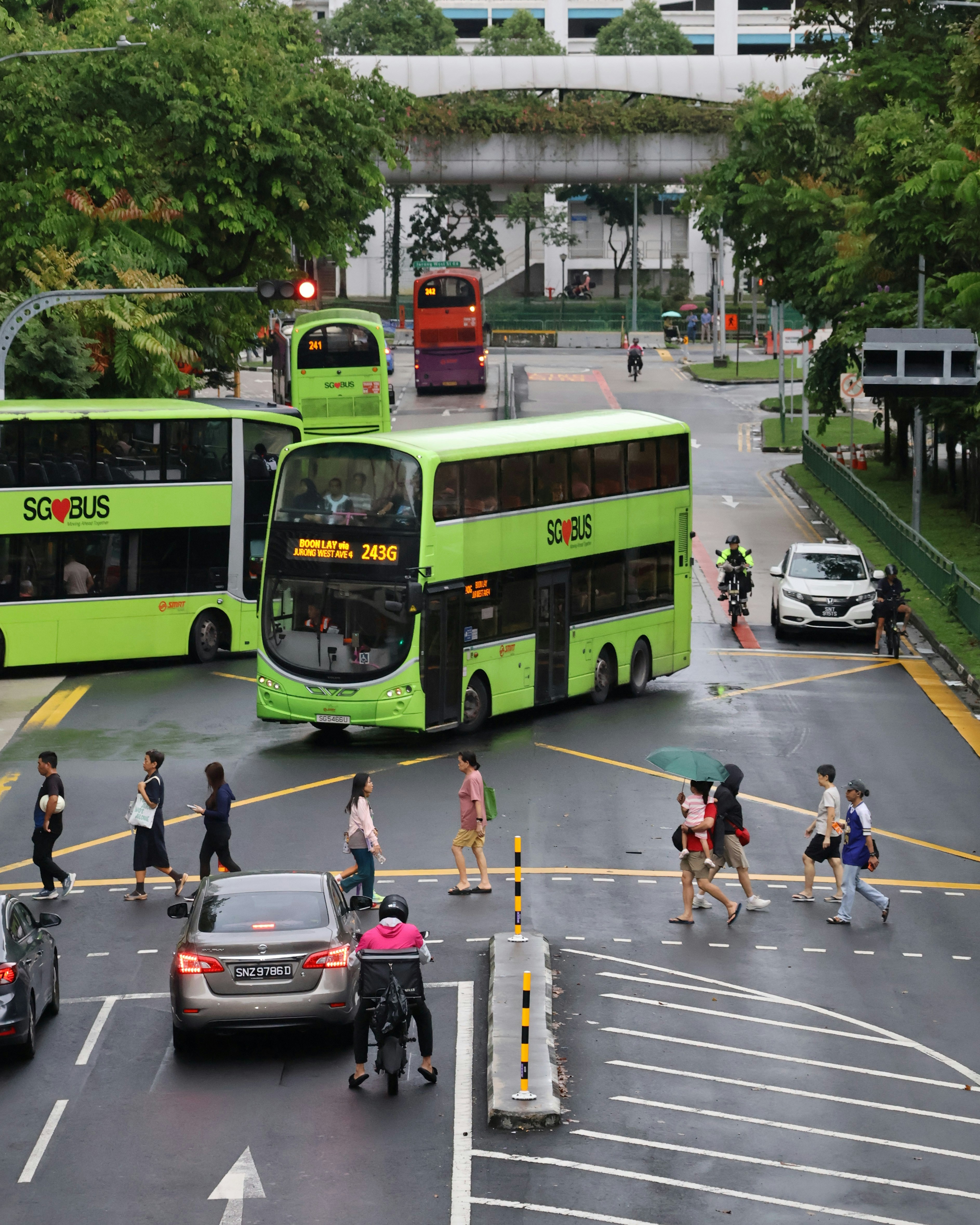 Crossroads of Motion: A City Bus Oasis Amid Pedestrian Flux