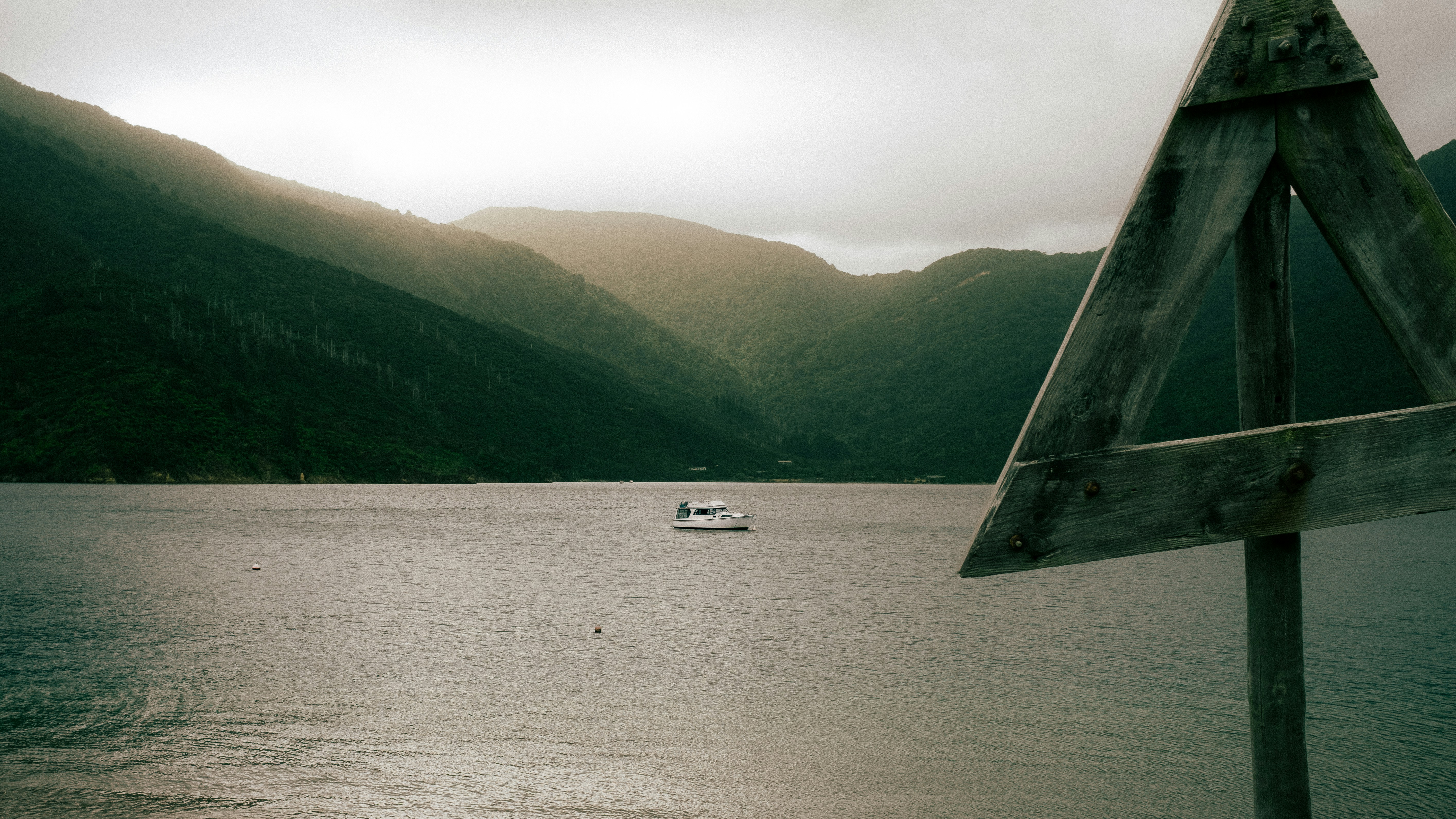 Isolated Boat in a Quiet Mountain Lake