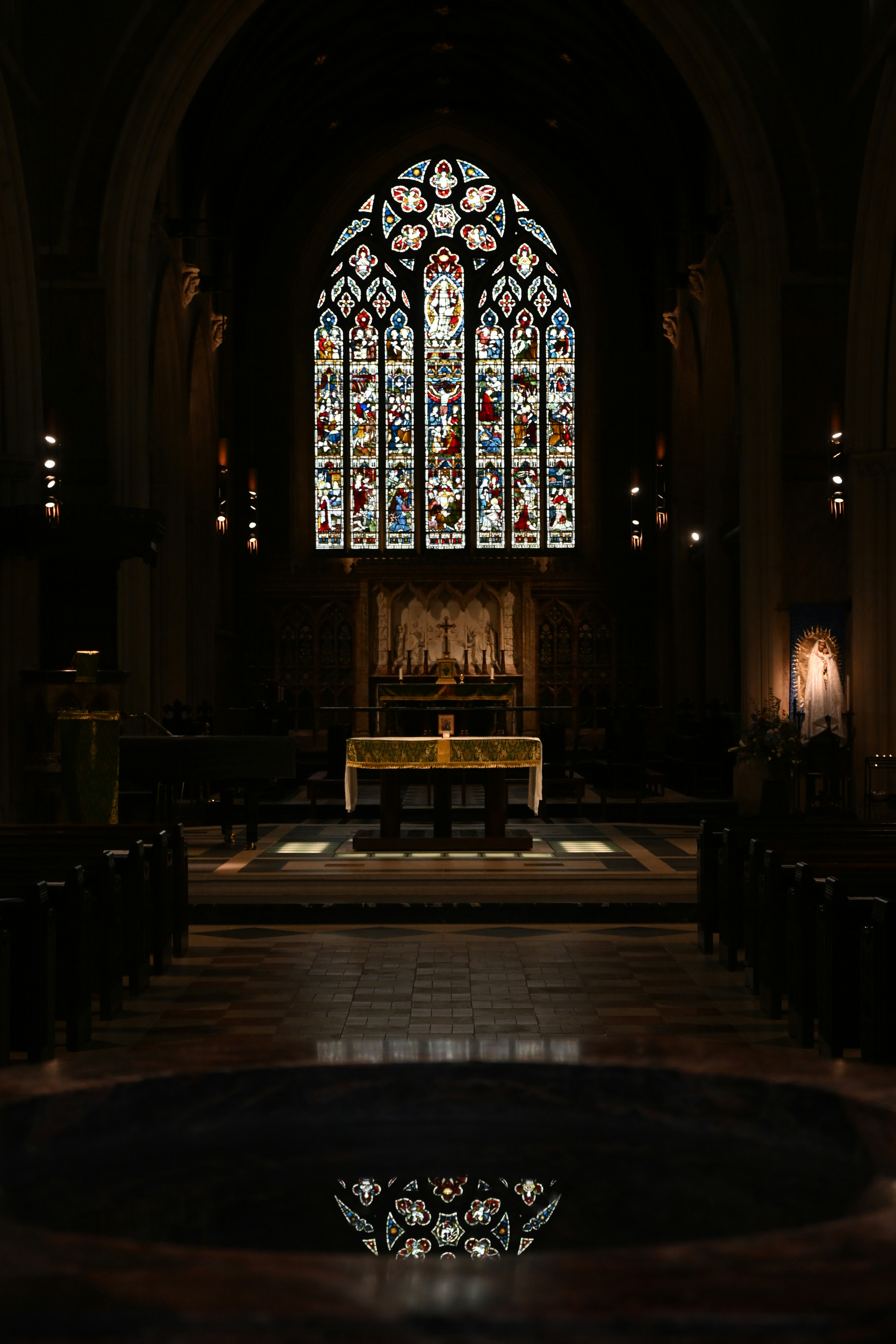 Stained Light at the Altar: A Quiet Cathedral Interior
