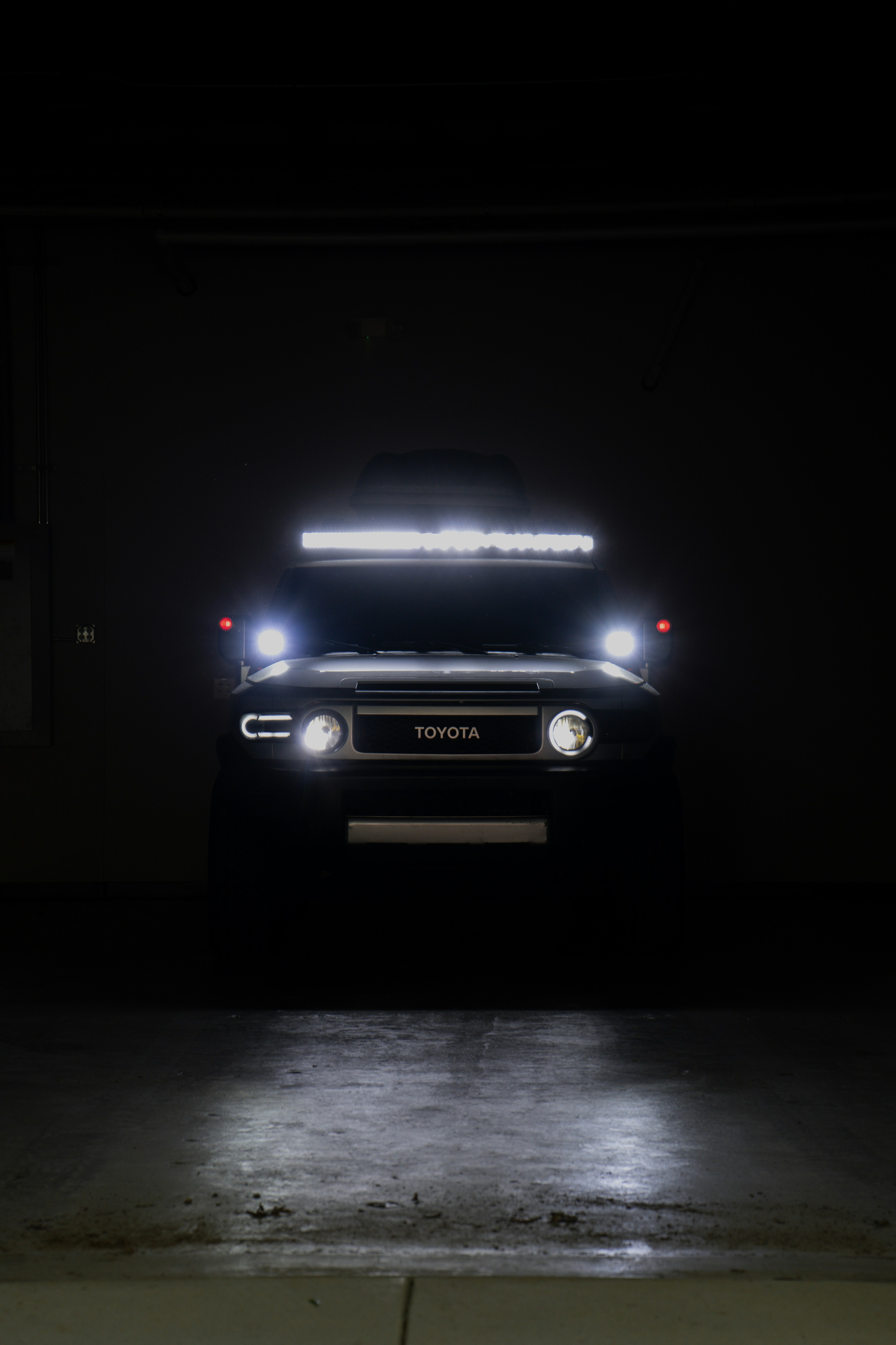 Midnight Toyota: Low-Key Front Pixel Shell with Bright Grille Strip