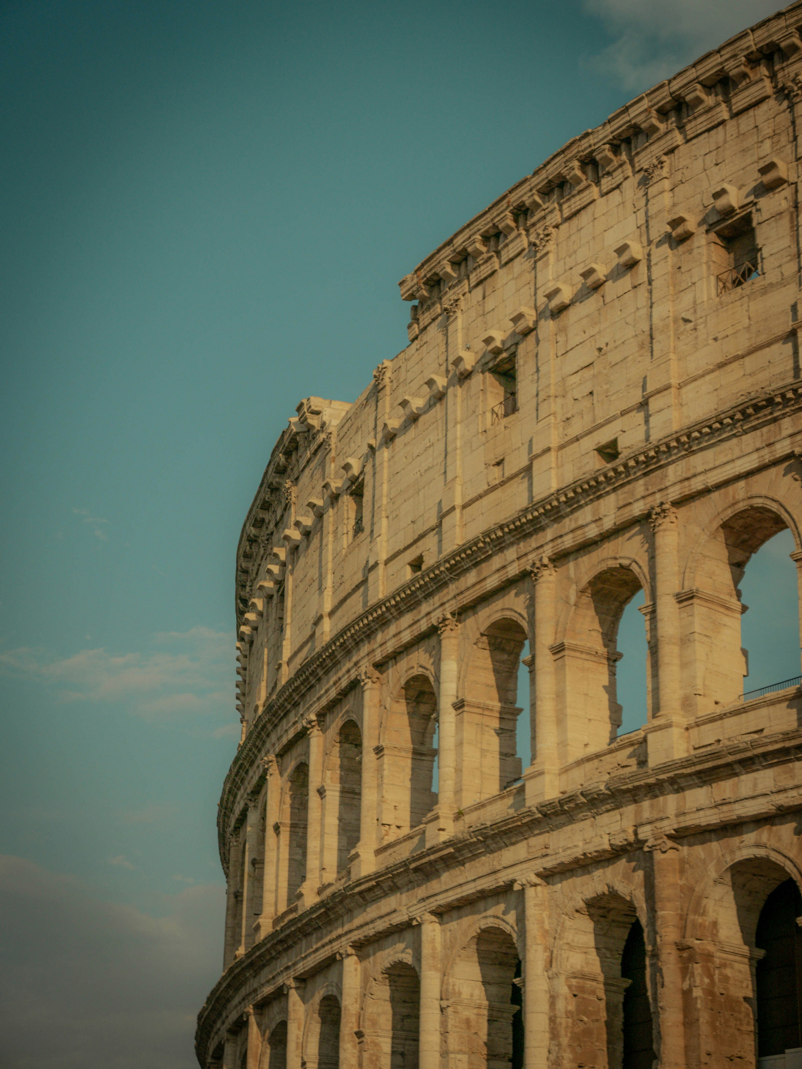 Ancient Colosseum Weaving Light: Sunlit Arches in Stone Atlas