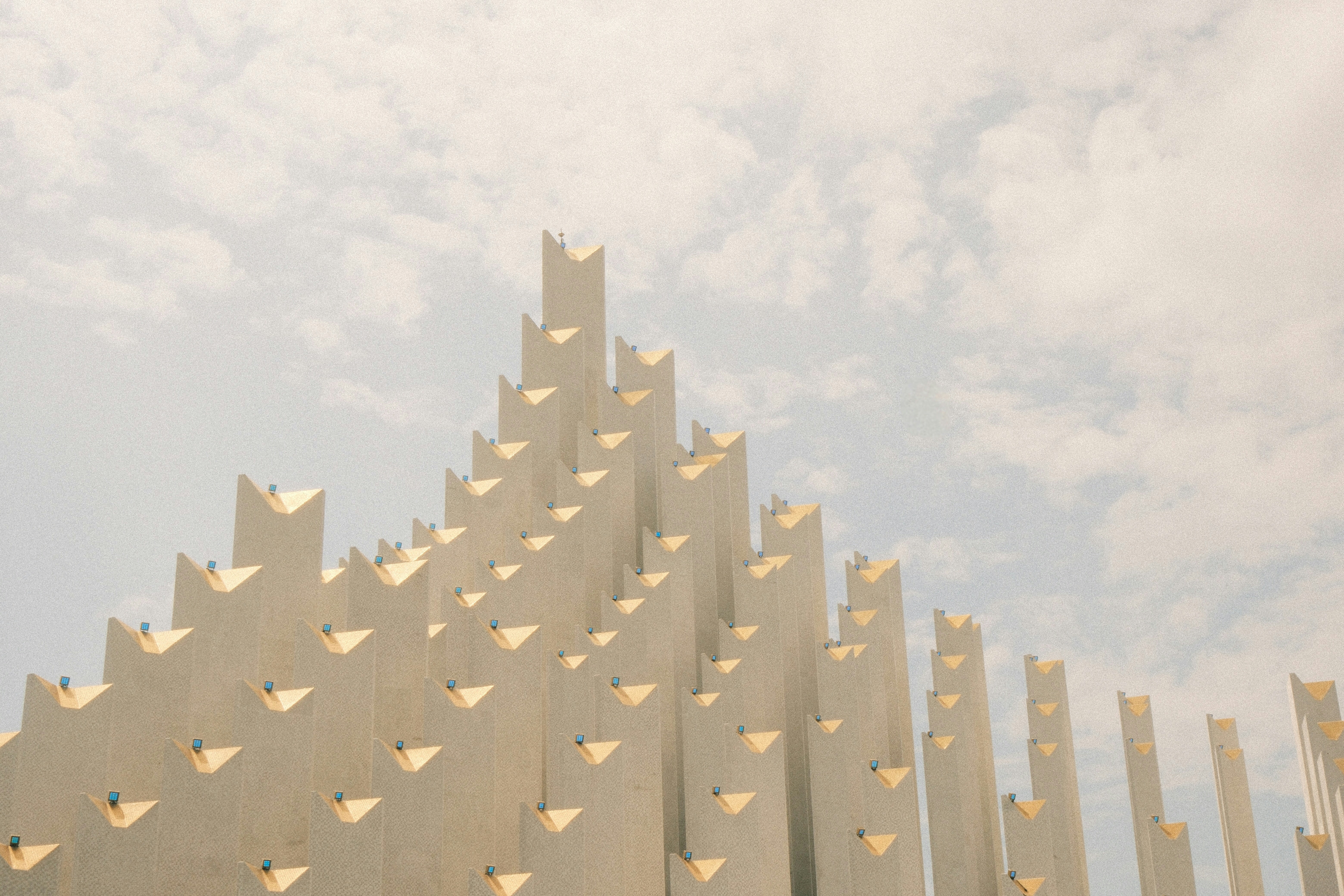Stone Steps of Light: A stepped sculpture Piercing the Sky