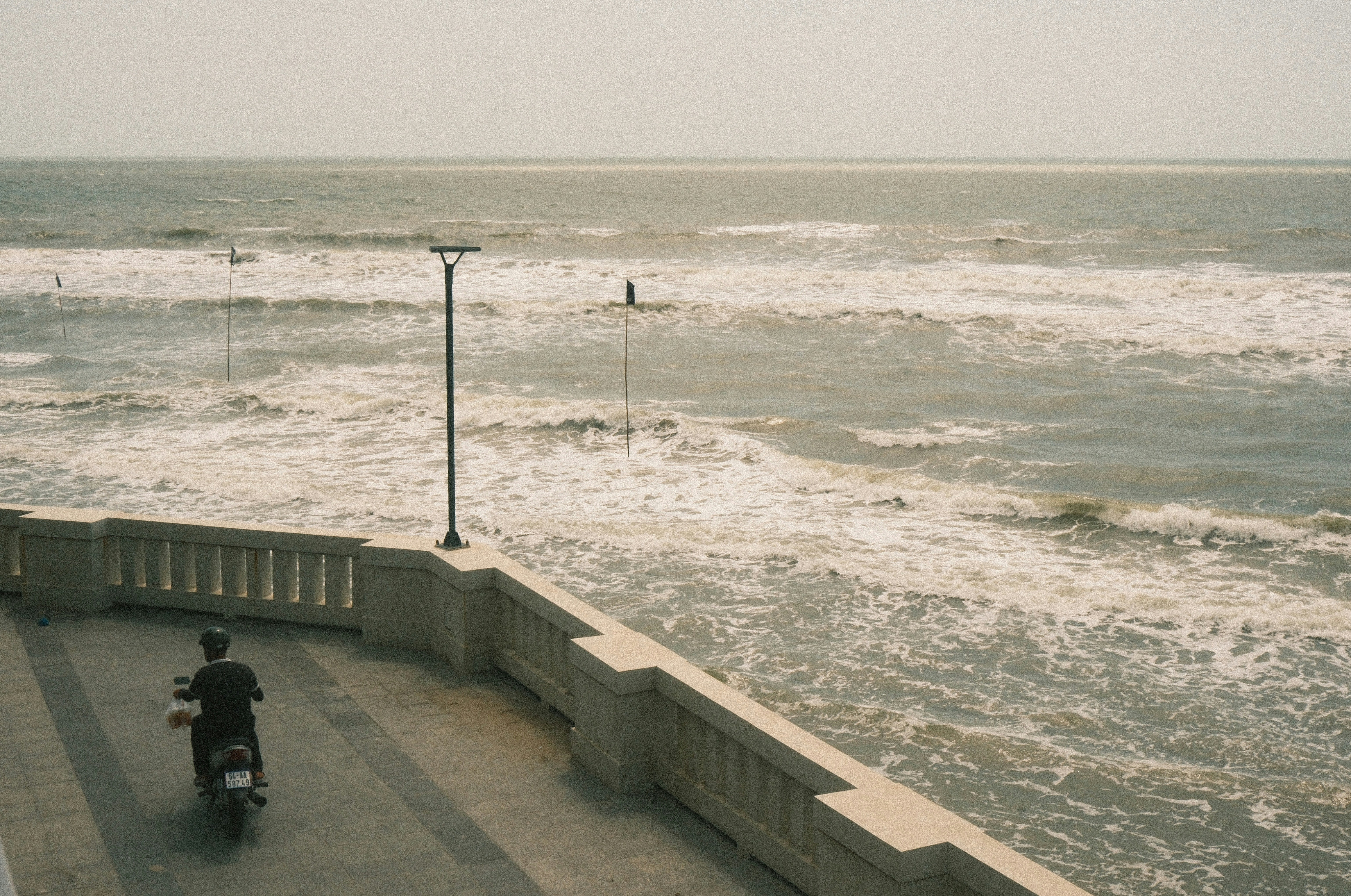 Seaside Promenade: Rider In the Gray Light