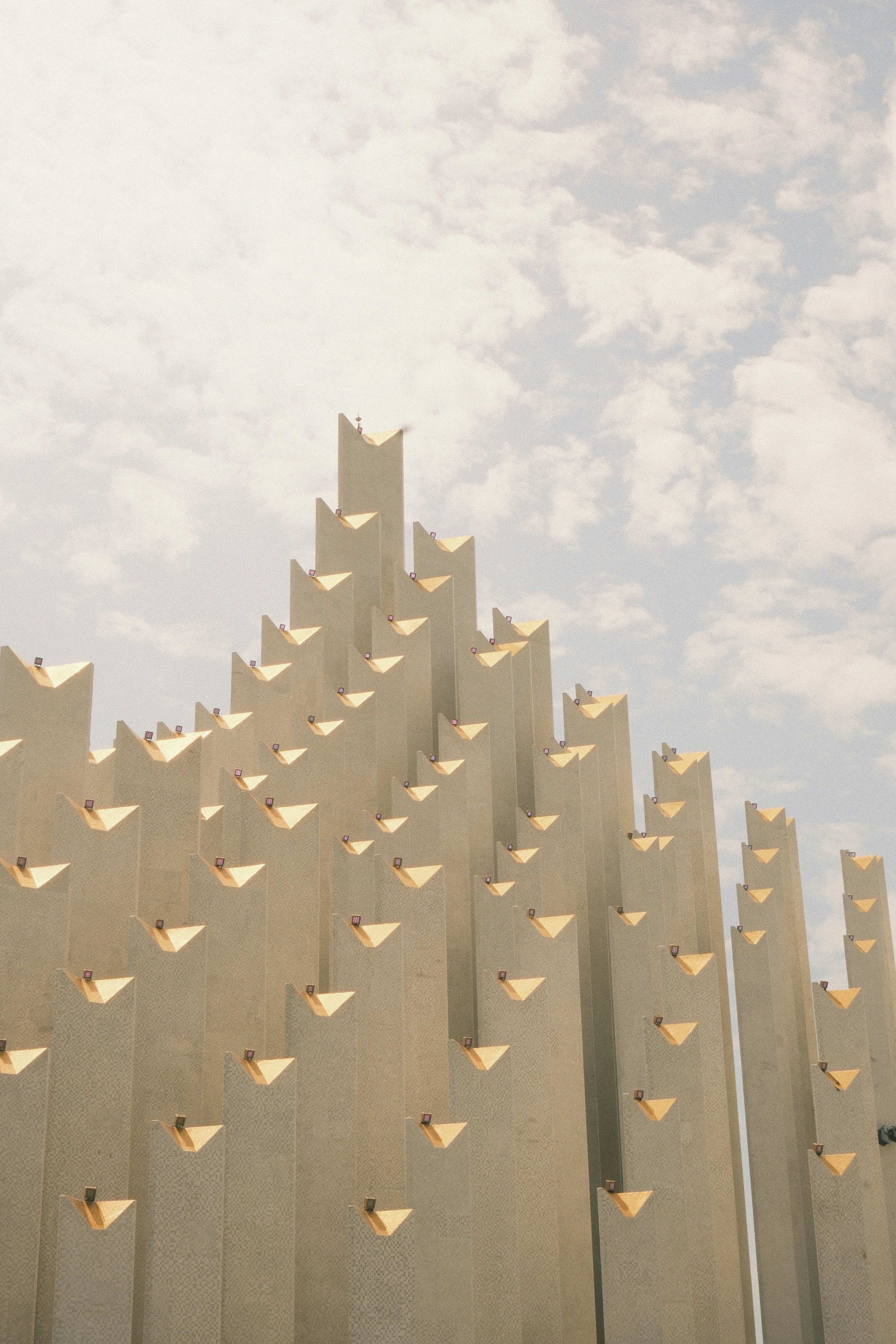 Concrete Peaks under a Soft Sky