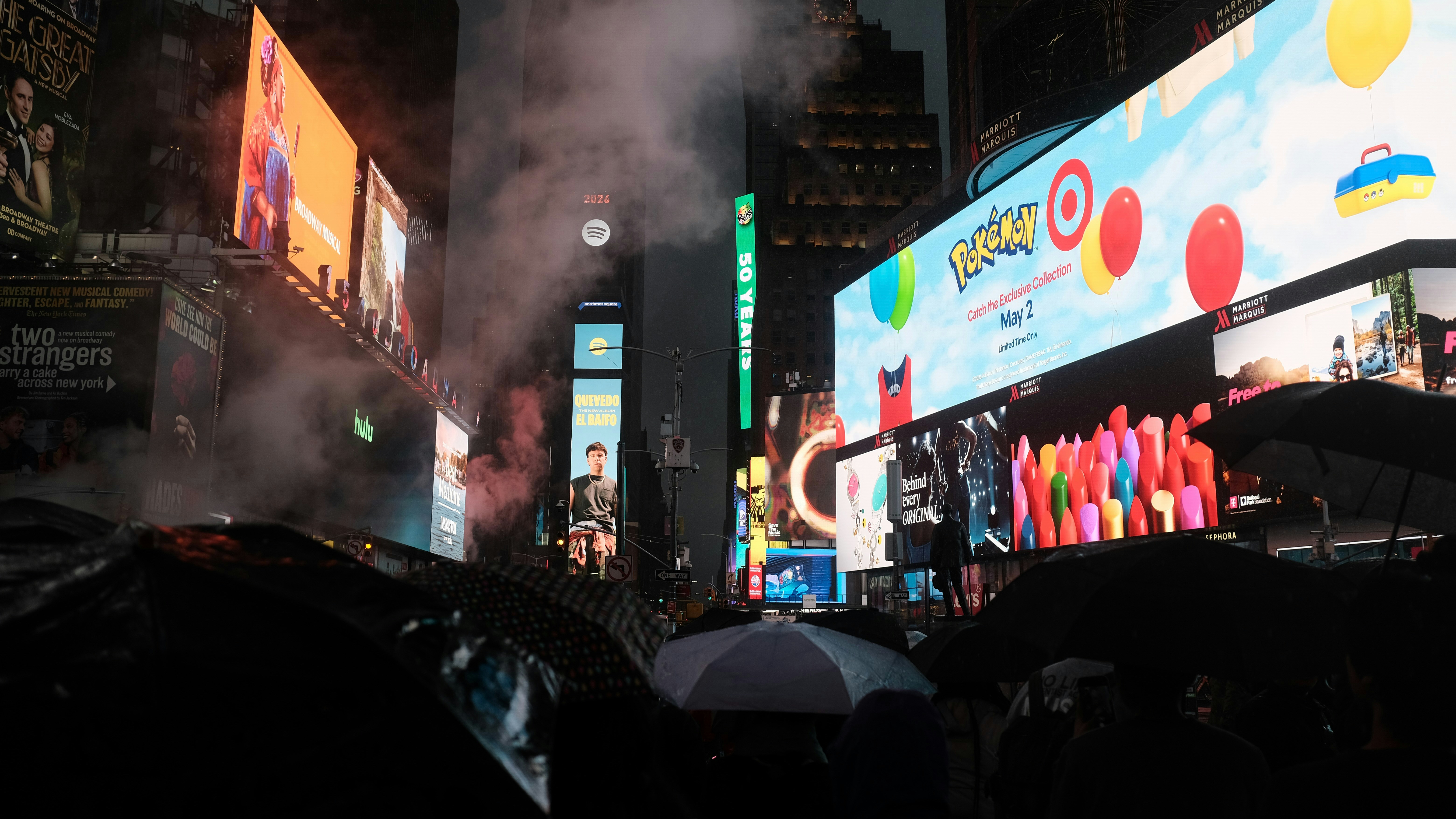 Neon Pulse in Times Square: A Rainy Night Under Colors and Crowds
