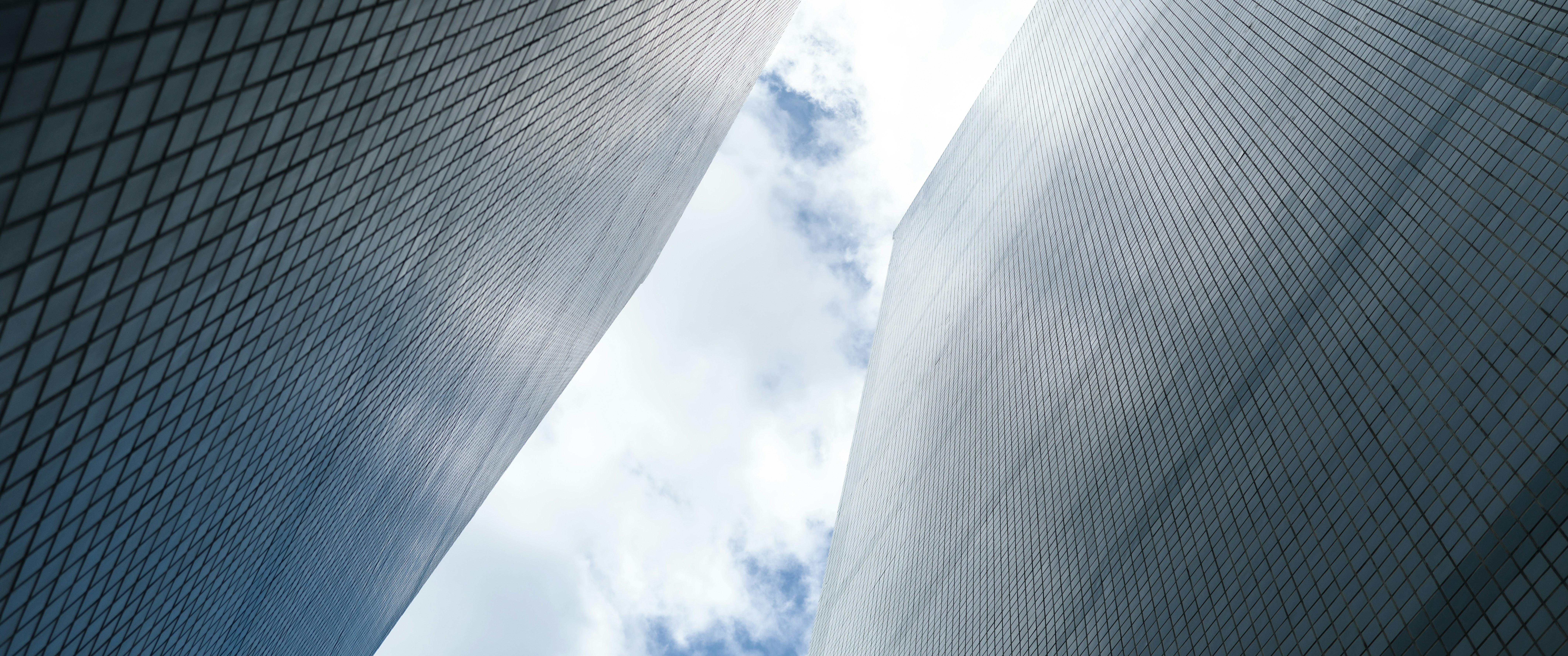 Skyward Slip: Sunlit Gaps Between Skyscrapers