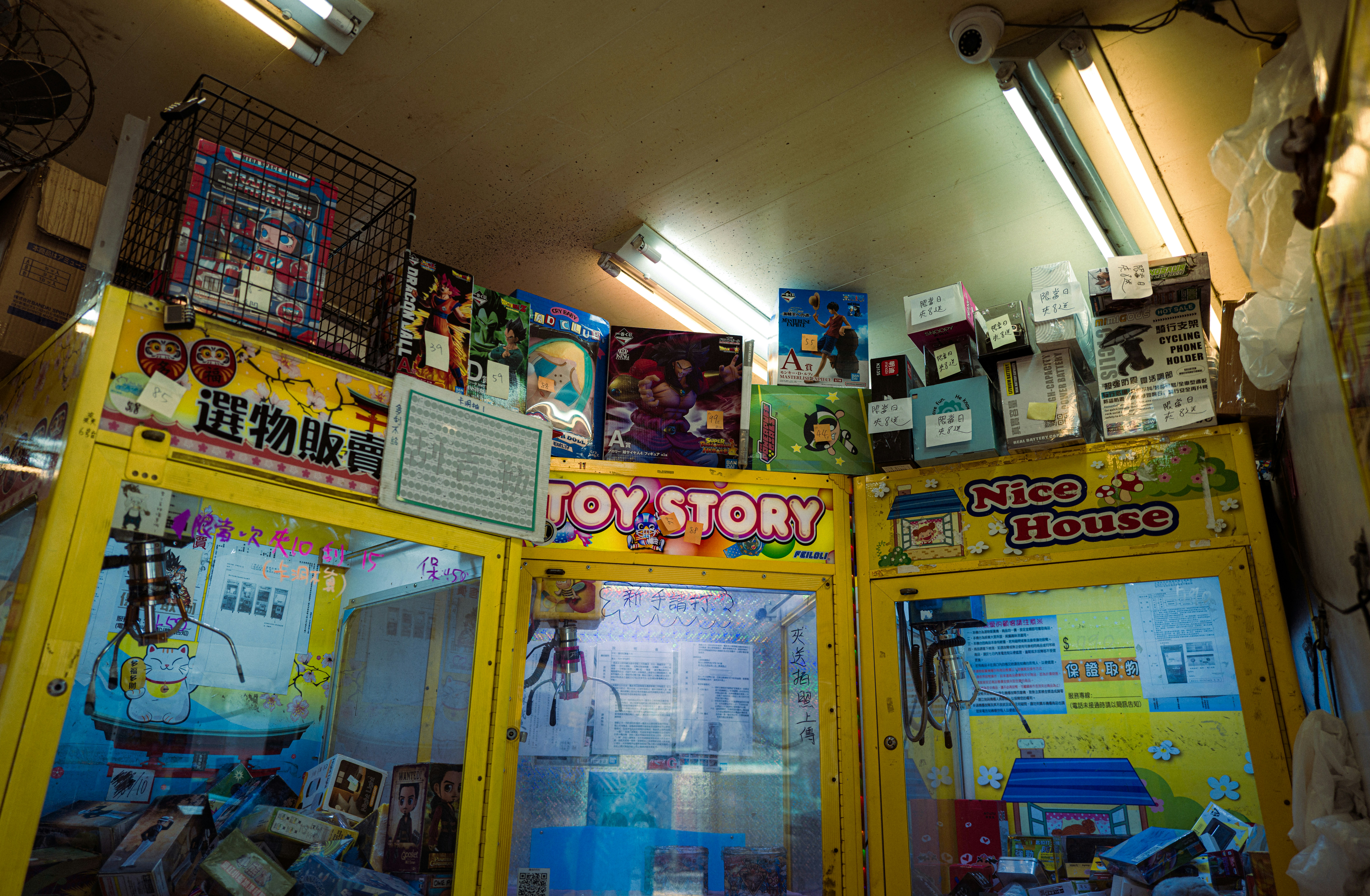 Claw Machines and Neon Echoes: A Cluttered Toy Arcade