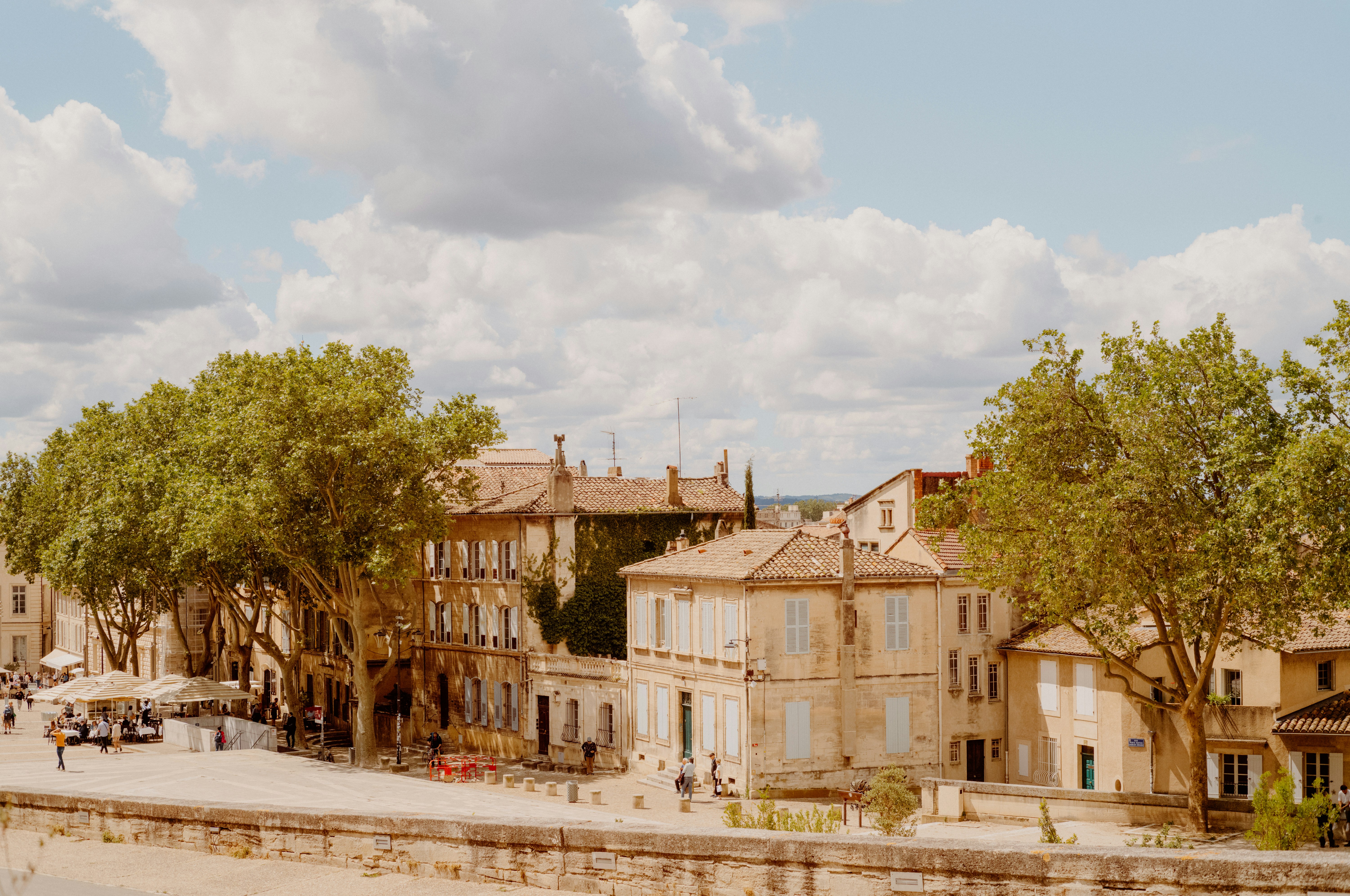 Sunlit Riverside Village: Warm Facades and Towertops