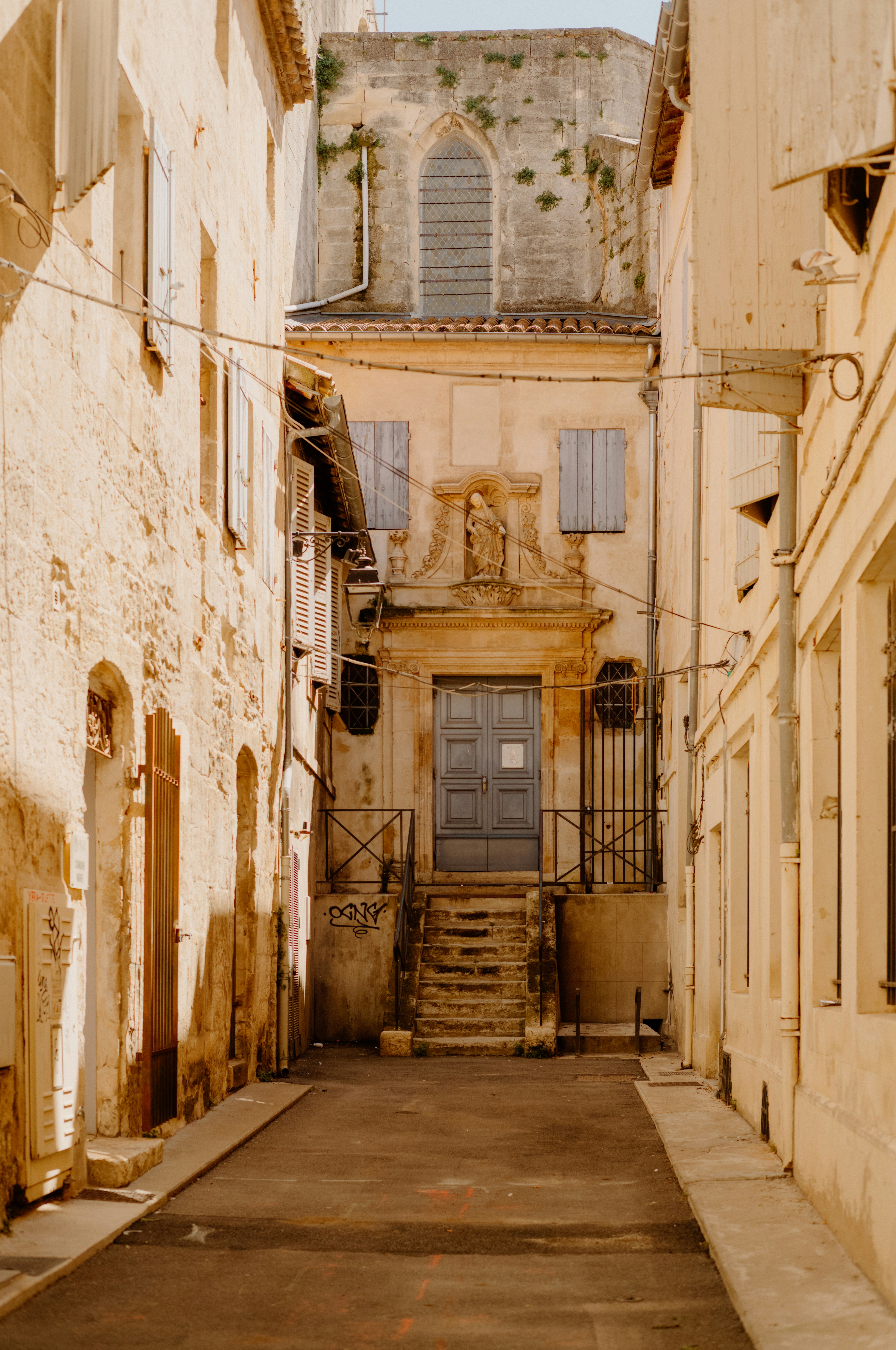 Sunlit Calle of Quiet Facades