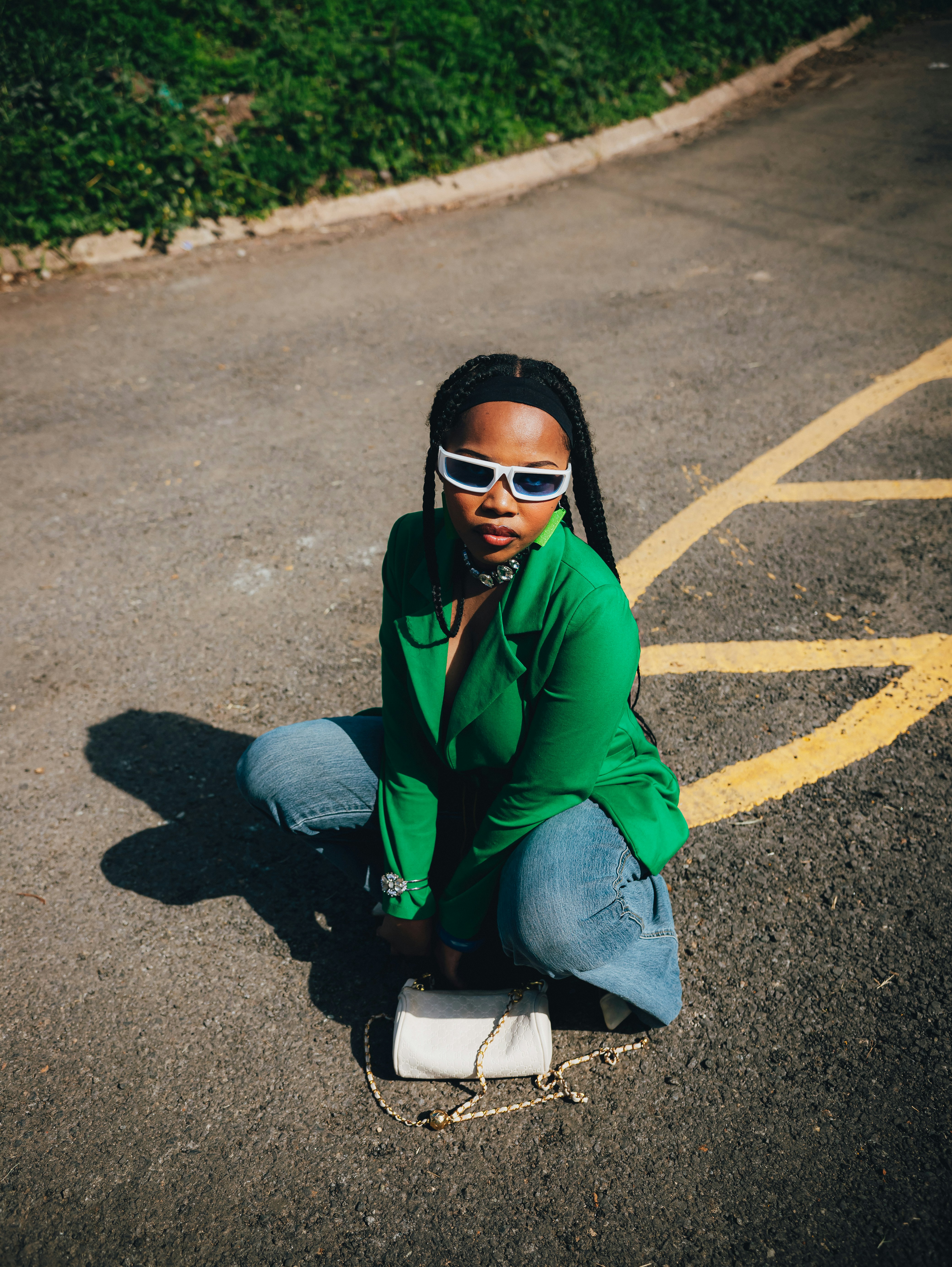 Green blazer, bold gaze: a street-shot of confidence in focus