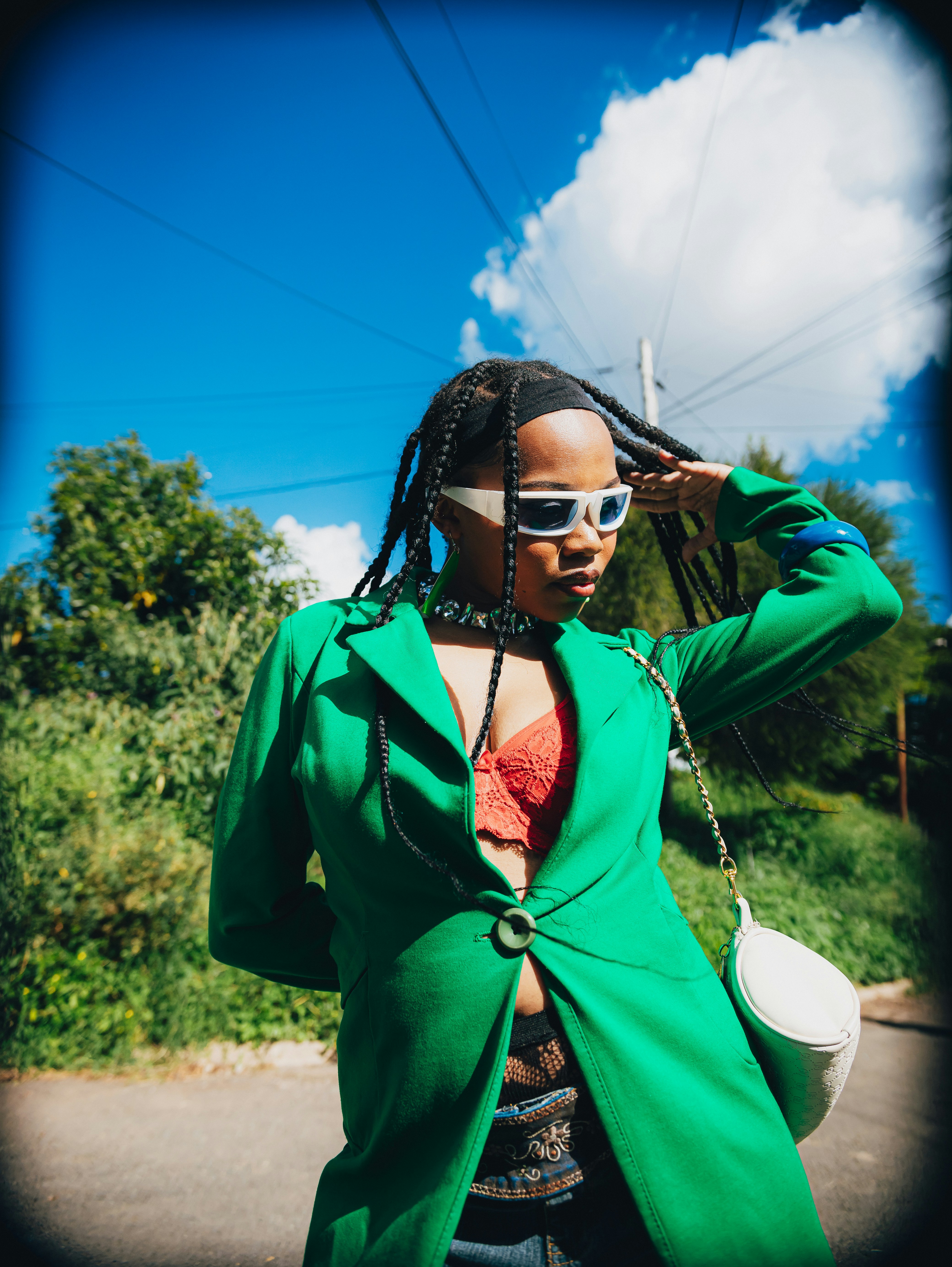 Emerald Blade: Bold Green Jacket, Bright Street Presence