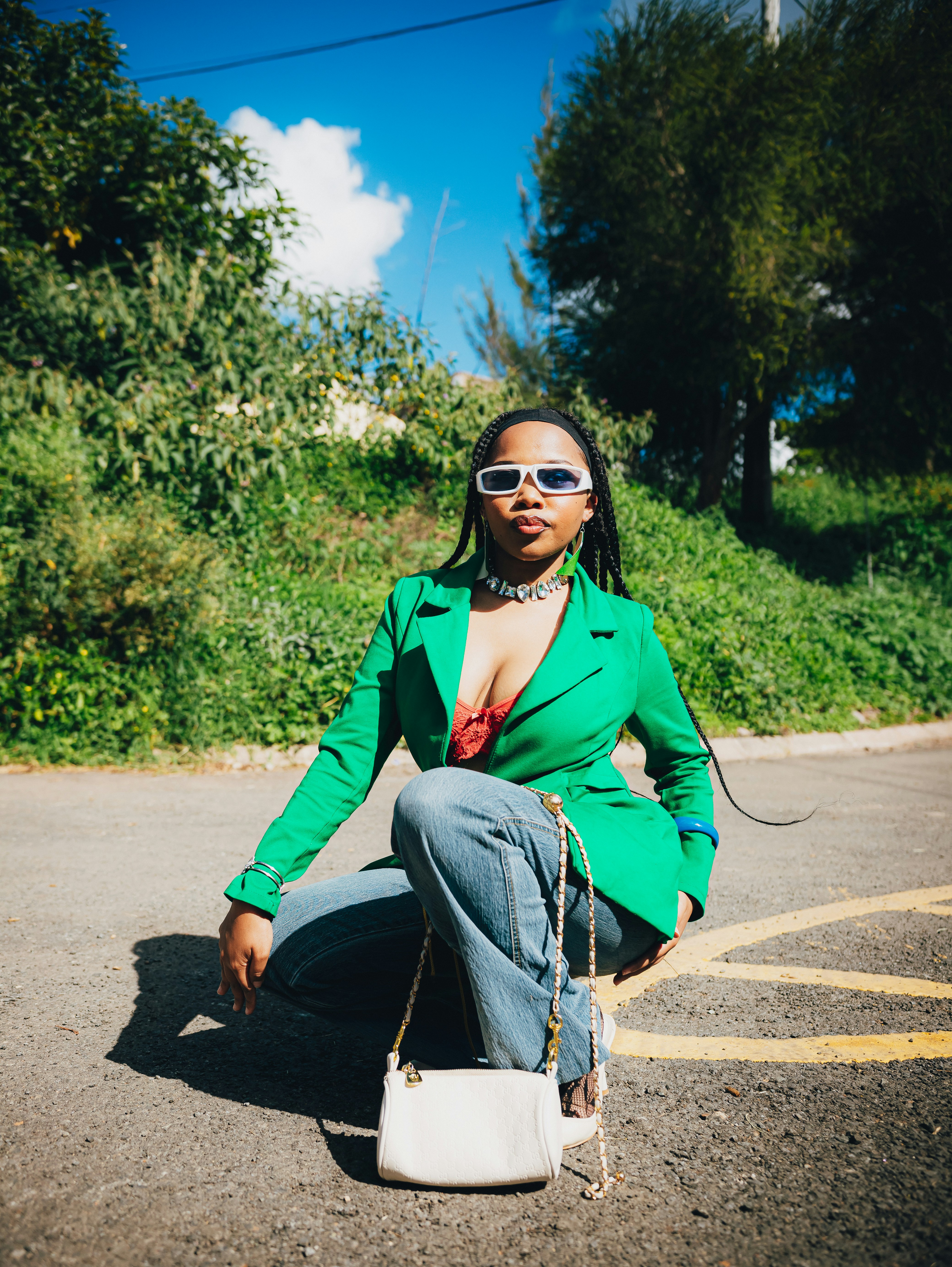 Green blazer, bold stance: a fashion-forward moment on the pavement