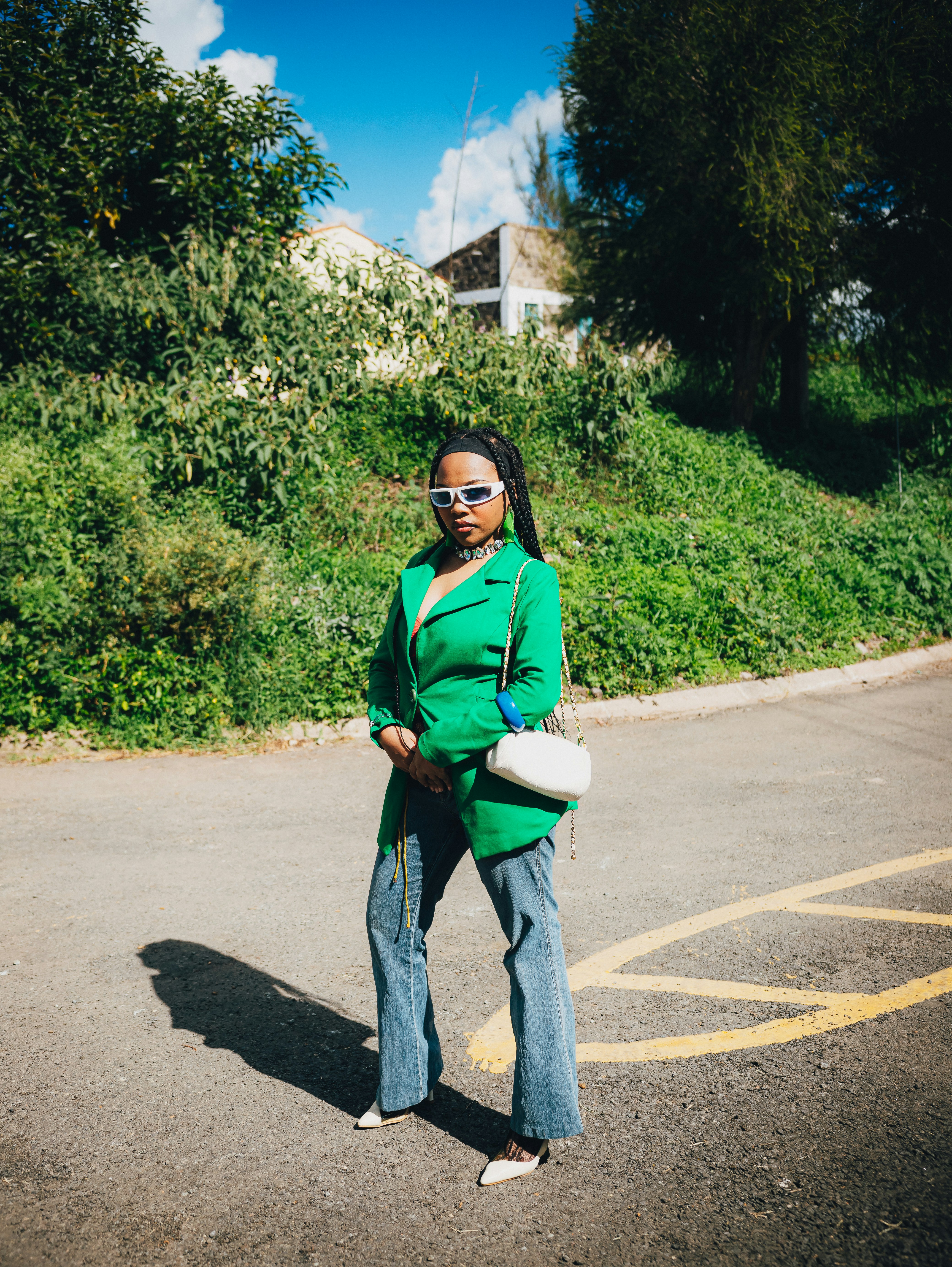 Neon Green Ensemble in a Quiet Parking Lot
