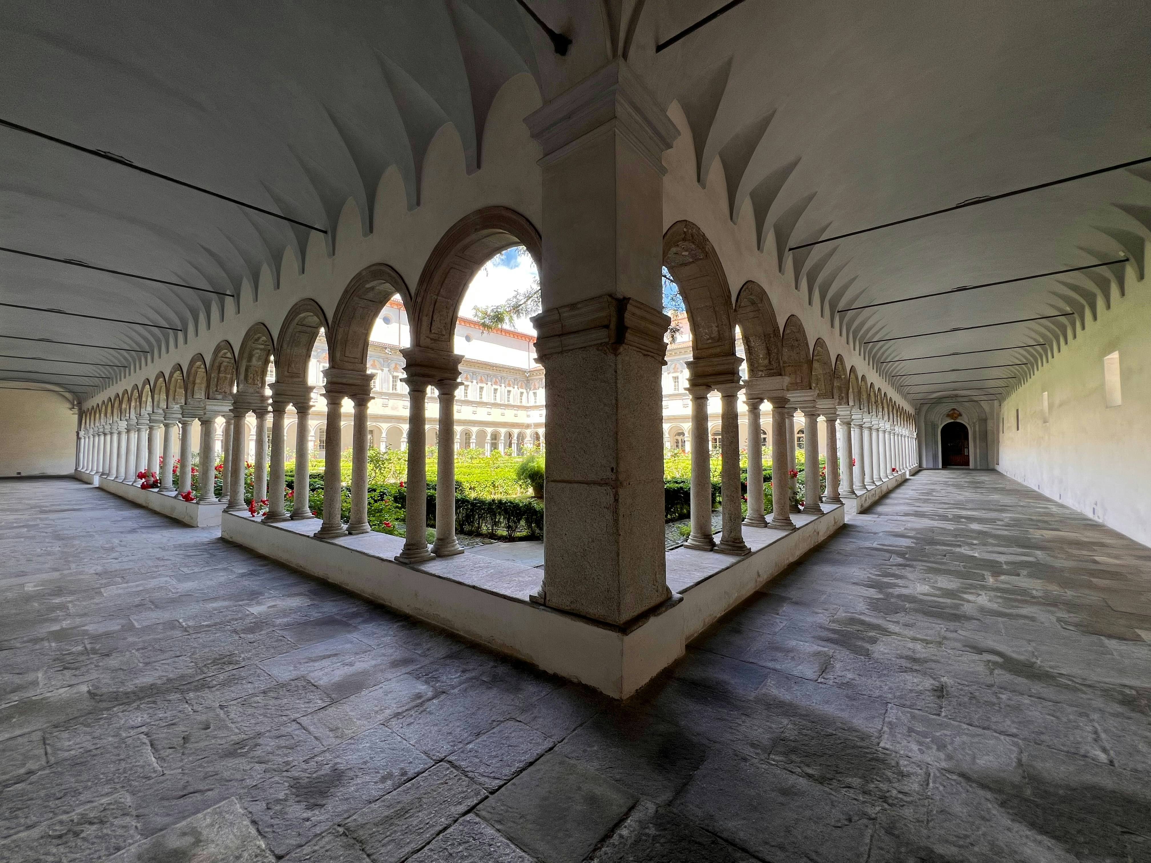 Symmetrical Cloister Corridor Framing the Quiet Courtyard