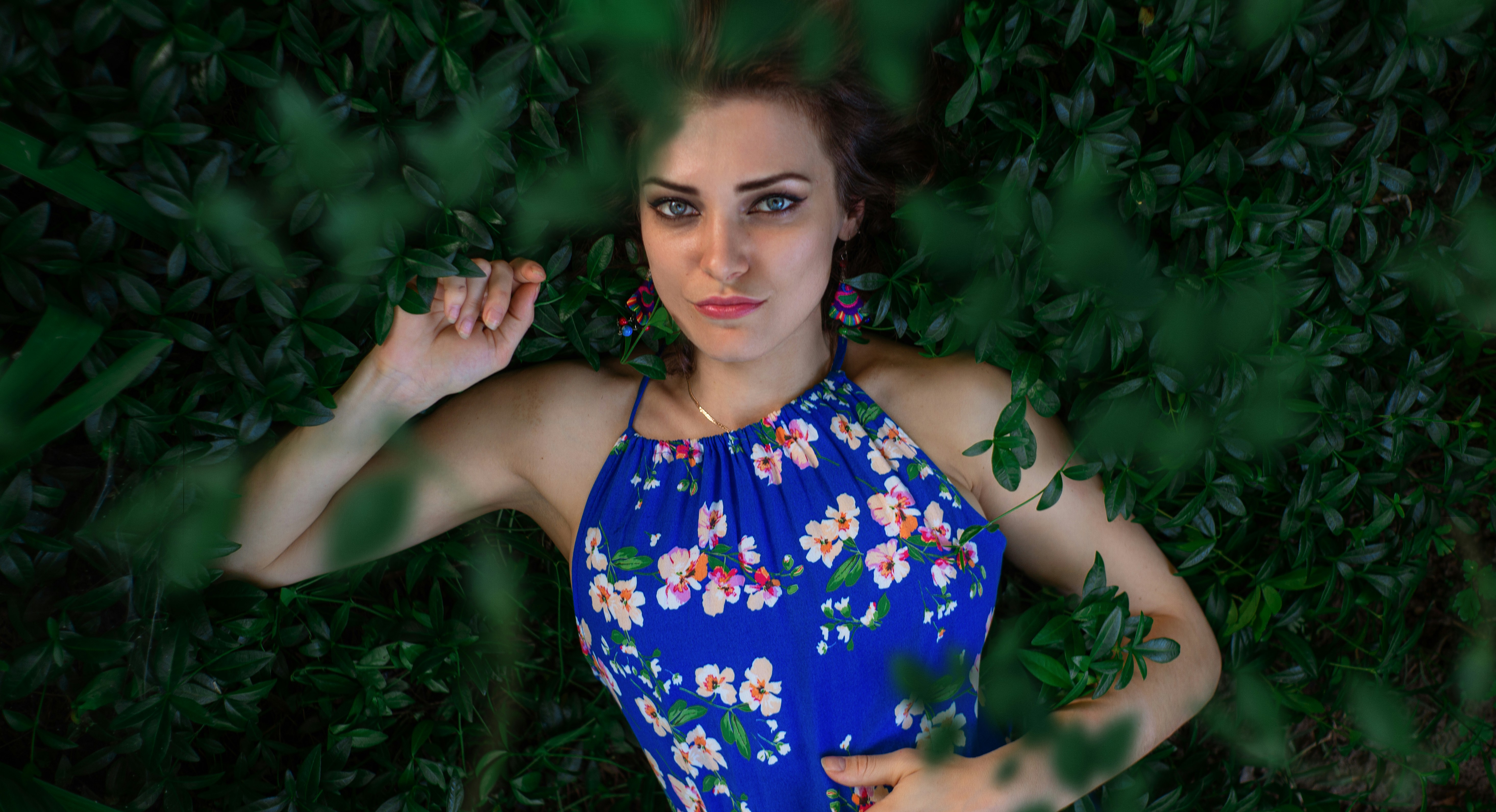 Floral portrait in a lush green frame