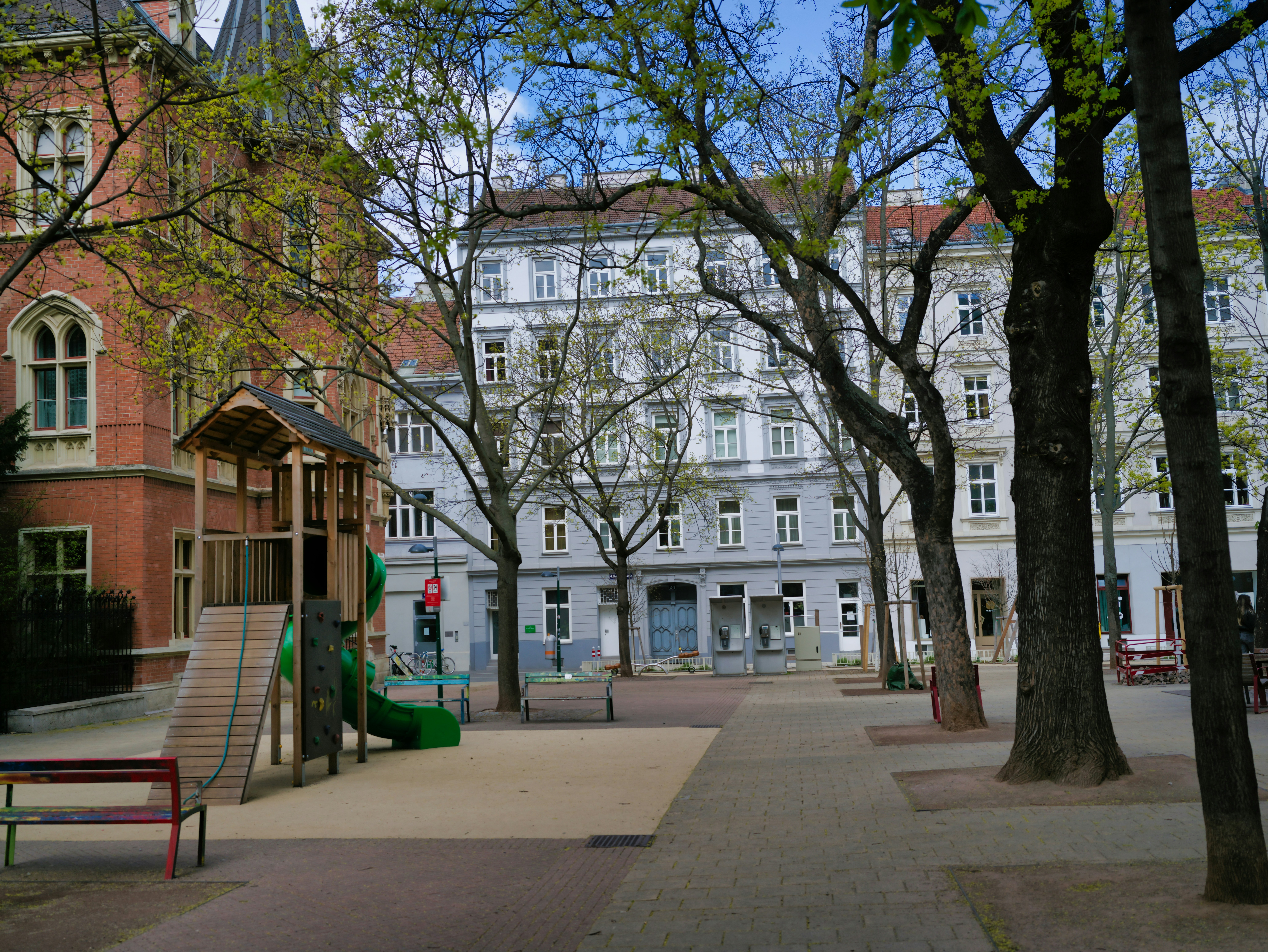 Quiet Street in a European Courtyard framed by pastel facades