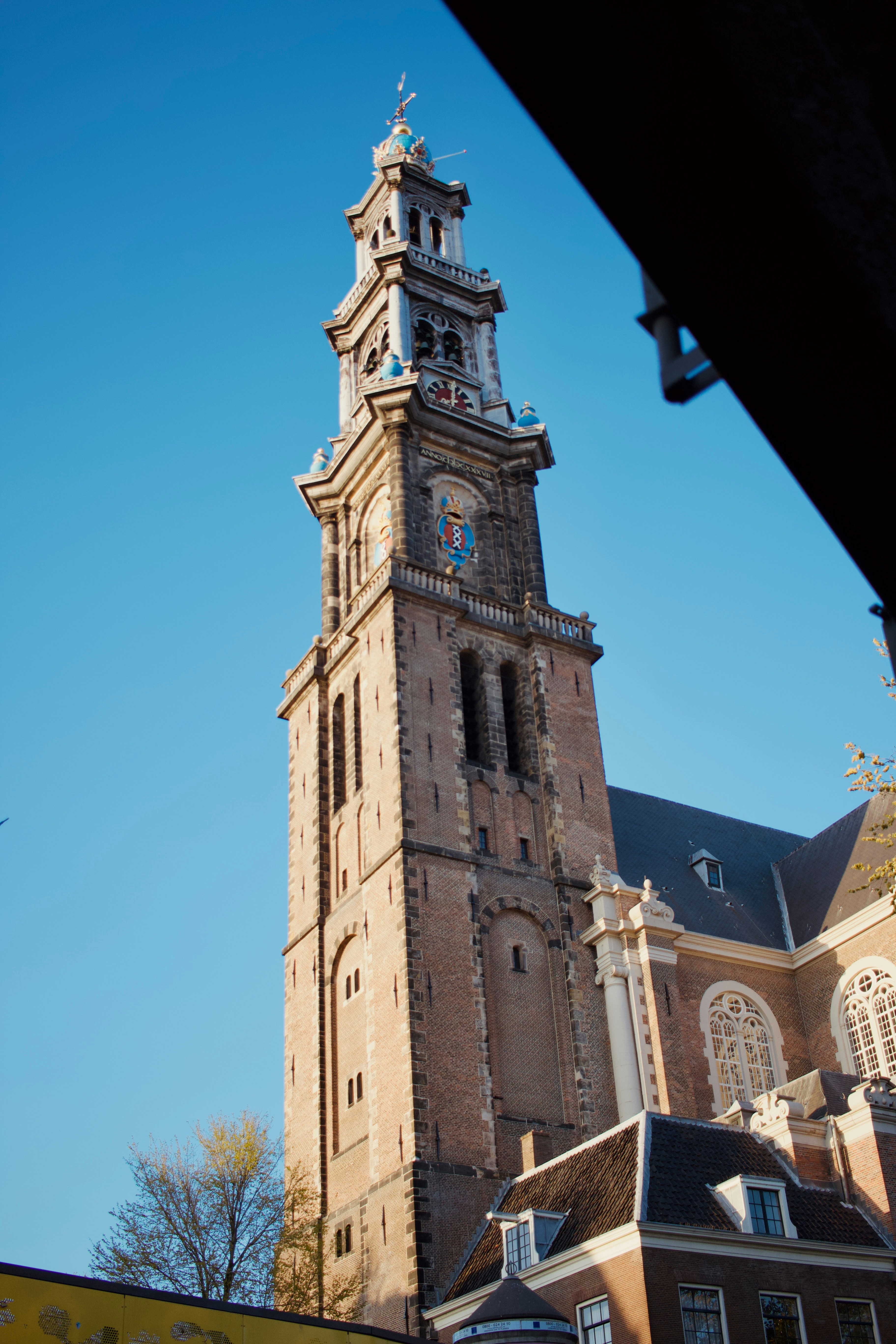 Towering Clockwork: A Belfry Reaches for the Clear Sky