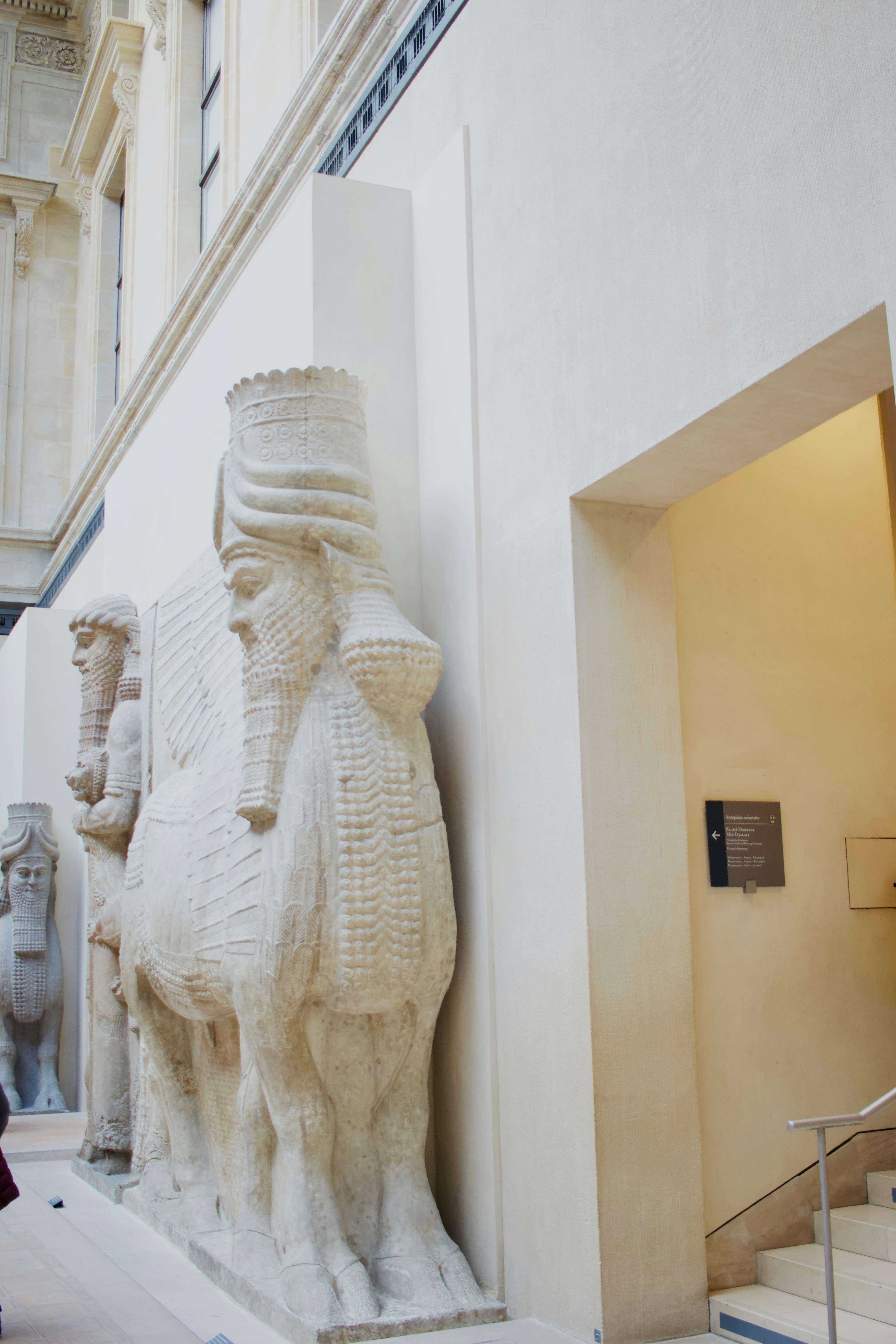 Stone Guardians at the Museum Threshold
