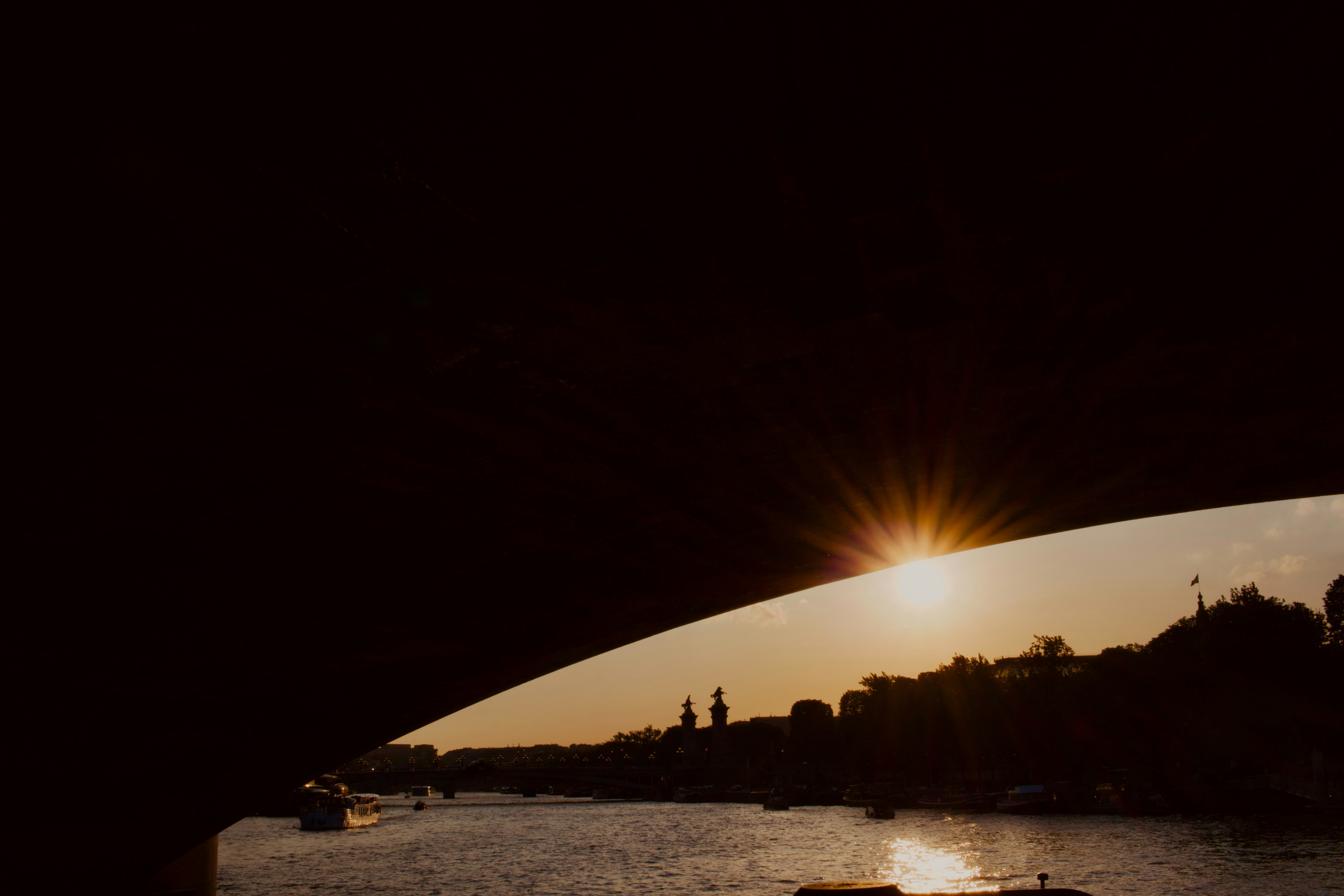 Sunburst Under the Bridge: Quiet Horizon Over the River