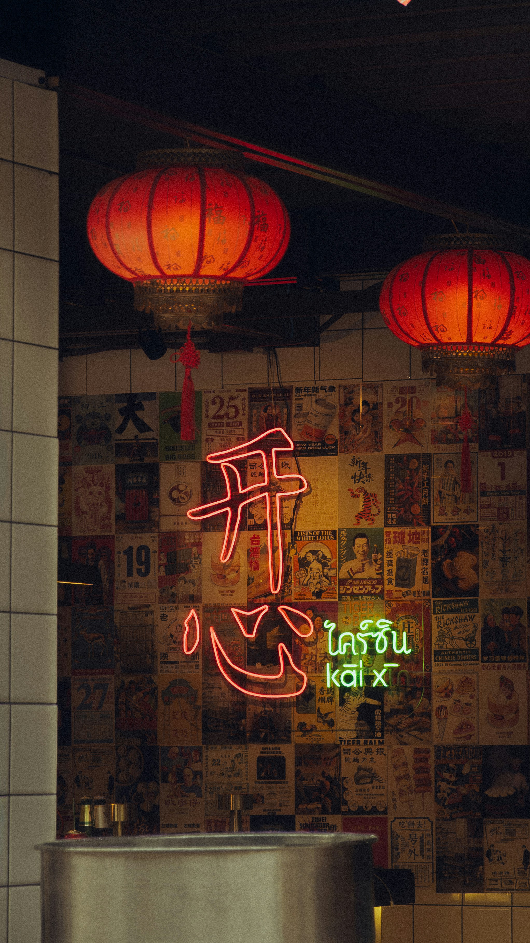 Neon Lanterns and Vintage Posters in a Night Market Nook
