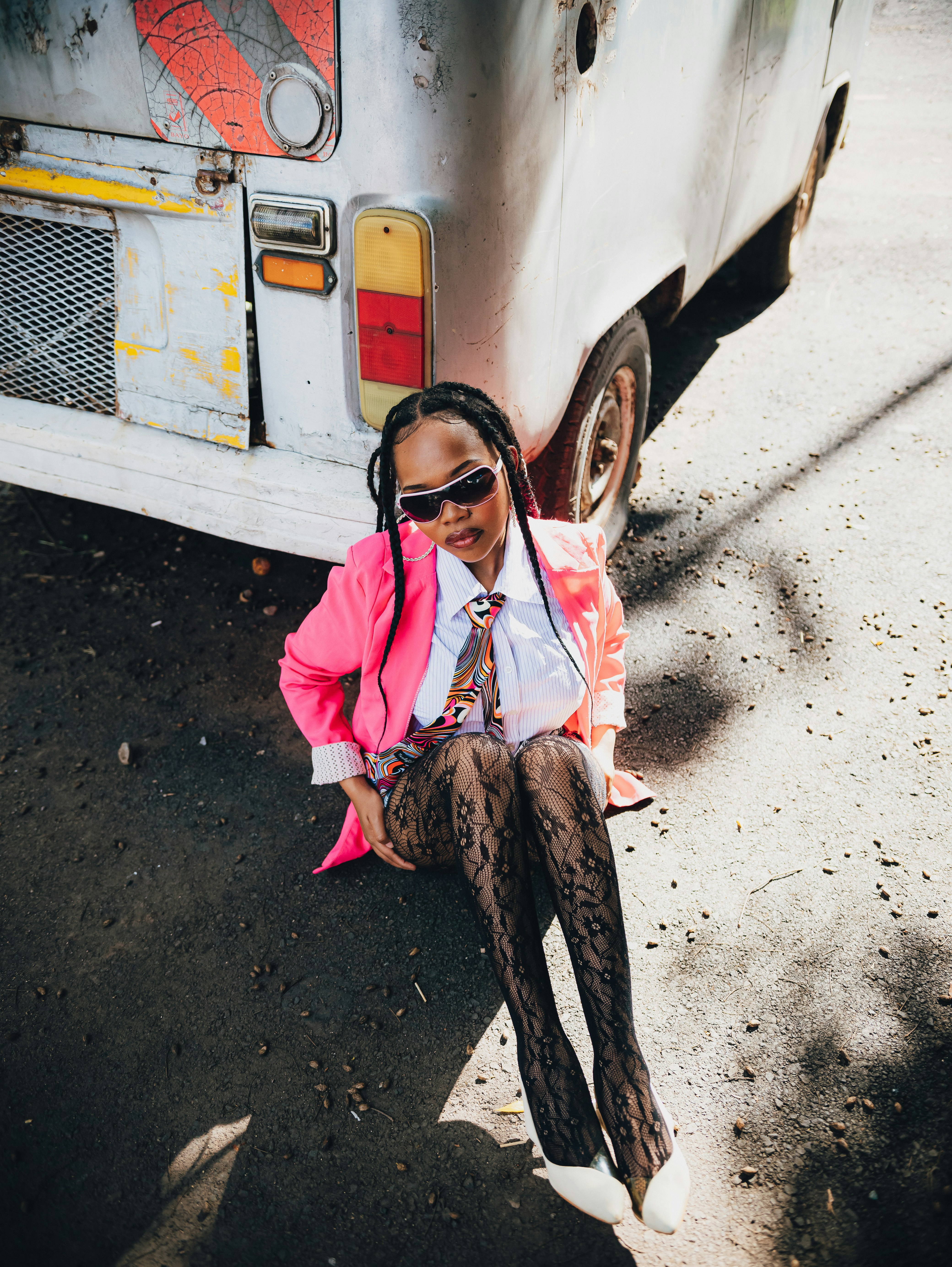 Bold City Style: A Kid Fresh in Pink on the Busyard foreground