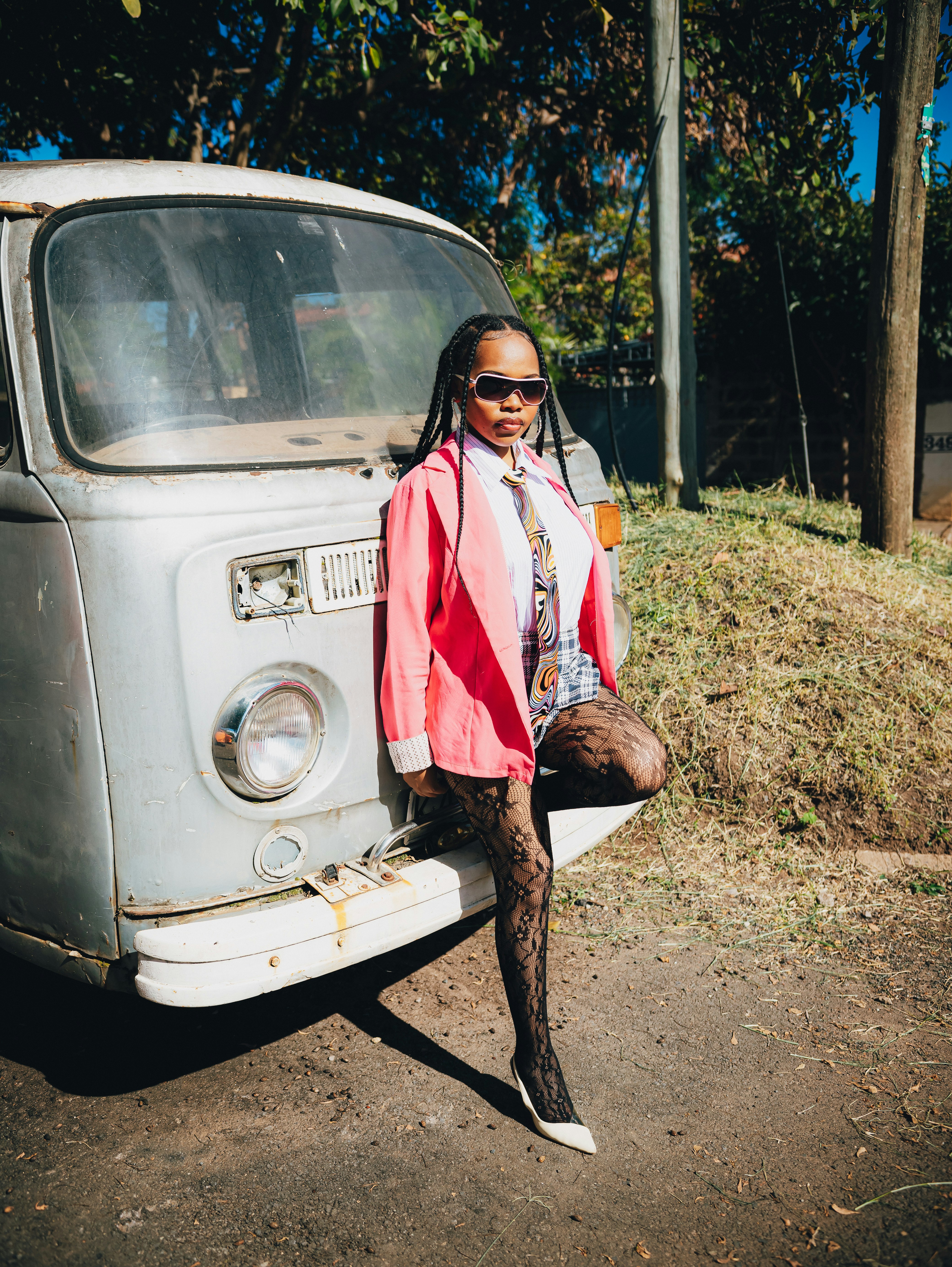 Vintage Vibe: A Bold Portrait by the Bus in Golden Light