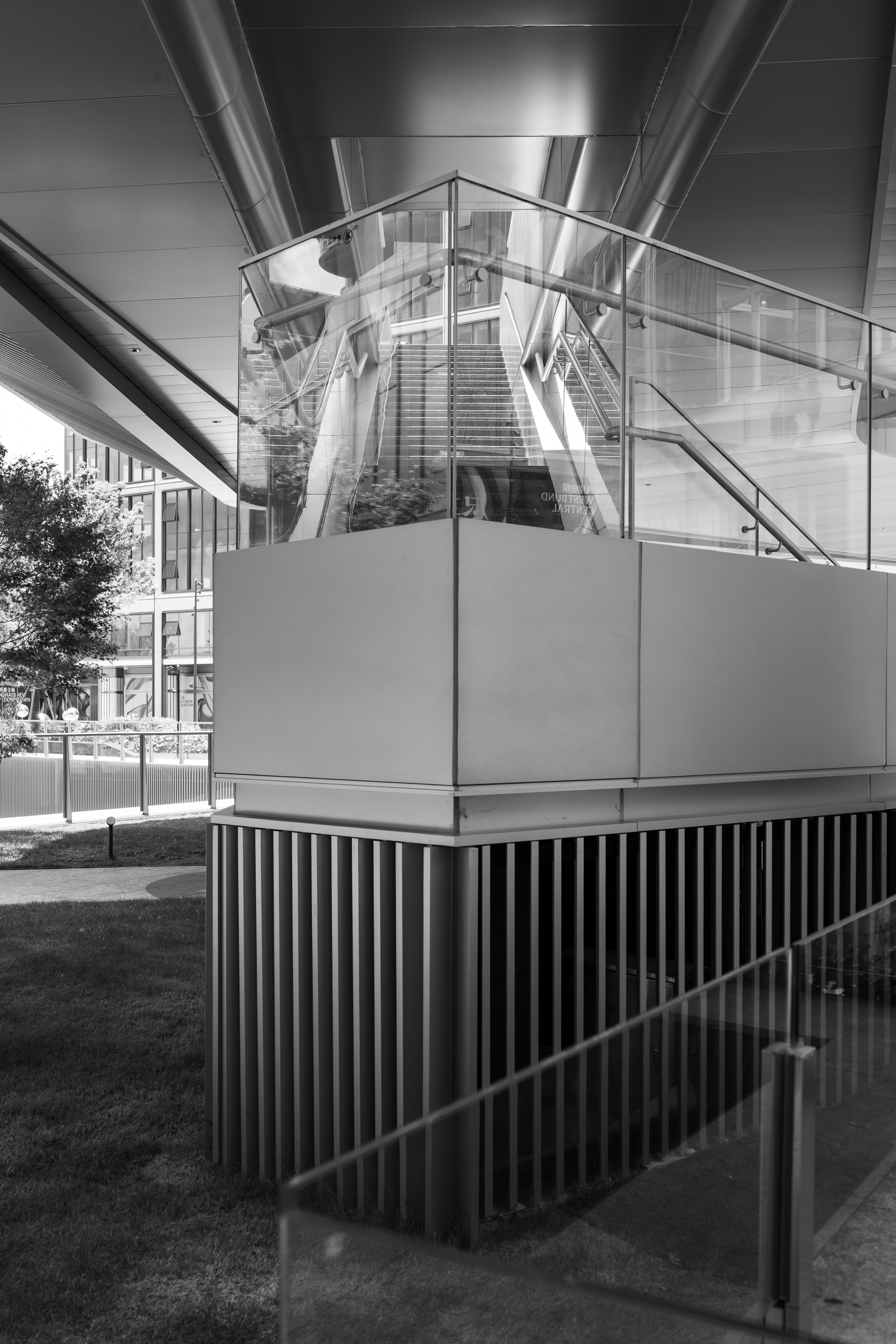 Glass Staircase Echoing Steel: An Urban Architectural Study