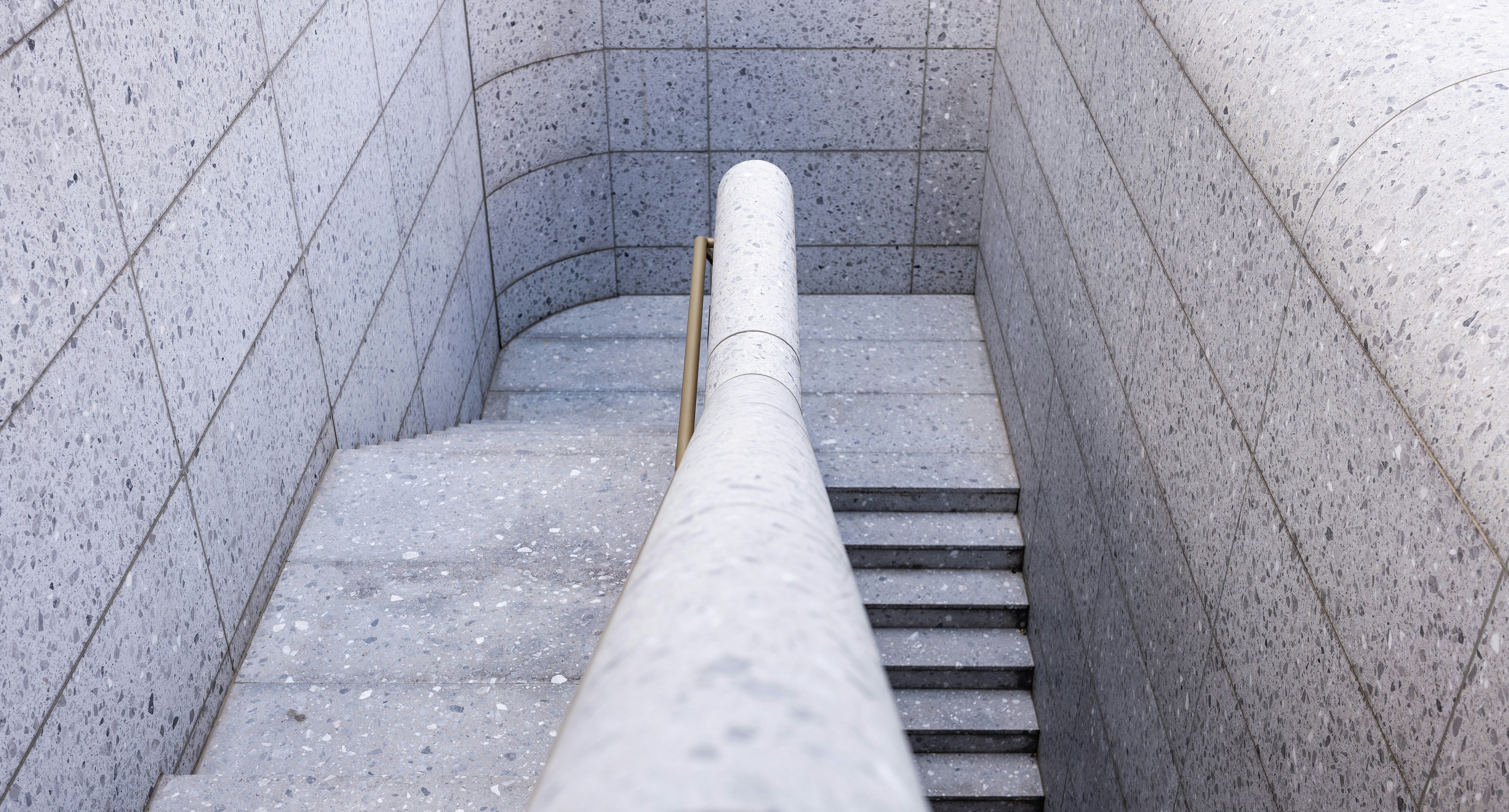 Concrete Descent: A Quiet Geometry of Stairs and Rail