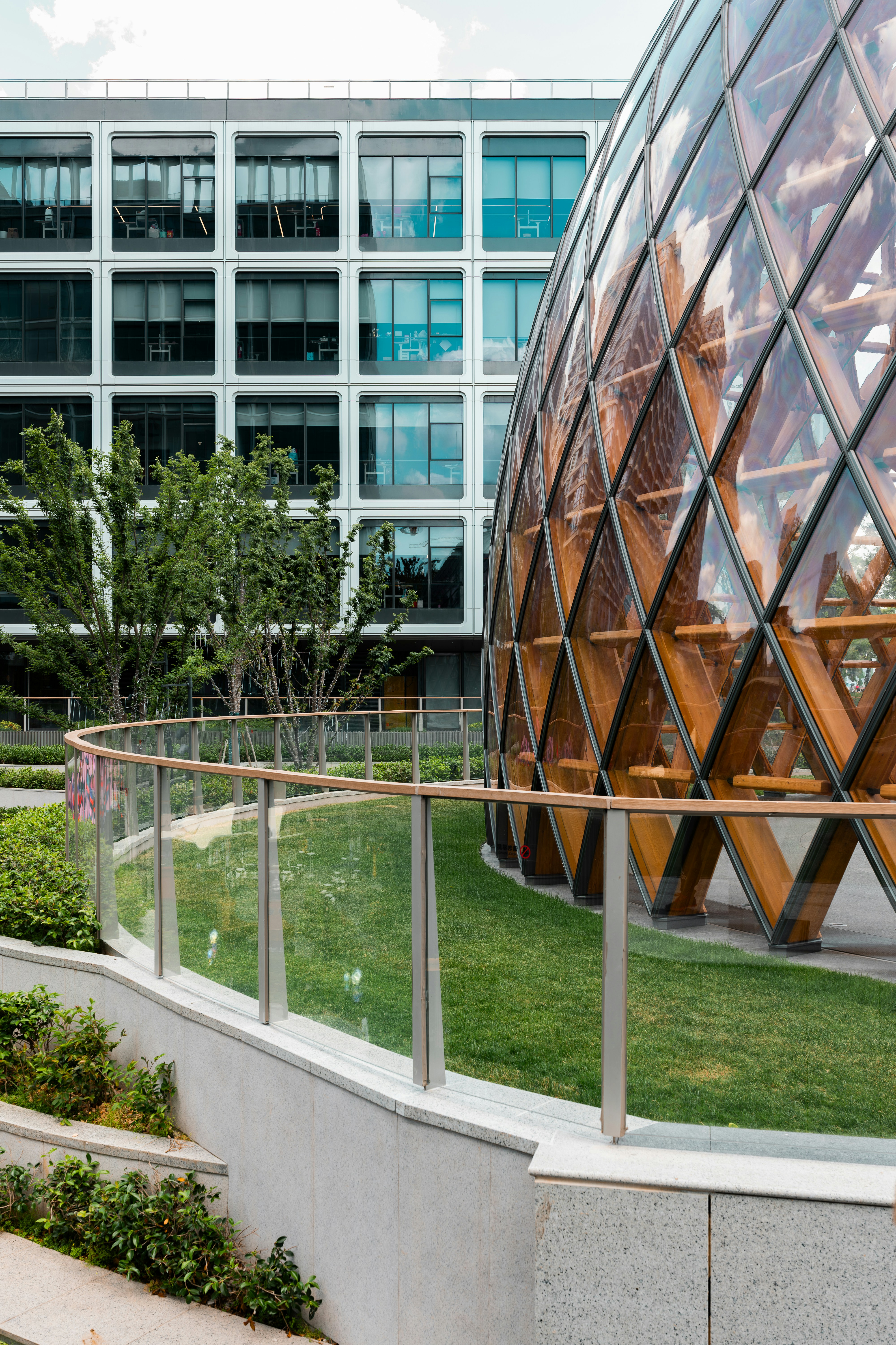 Geometric Glass Dome Meets Modern Facade