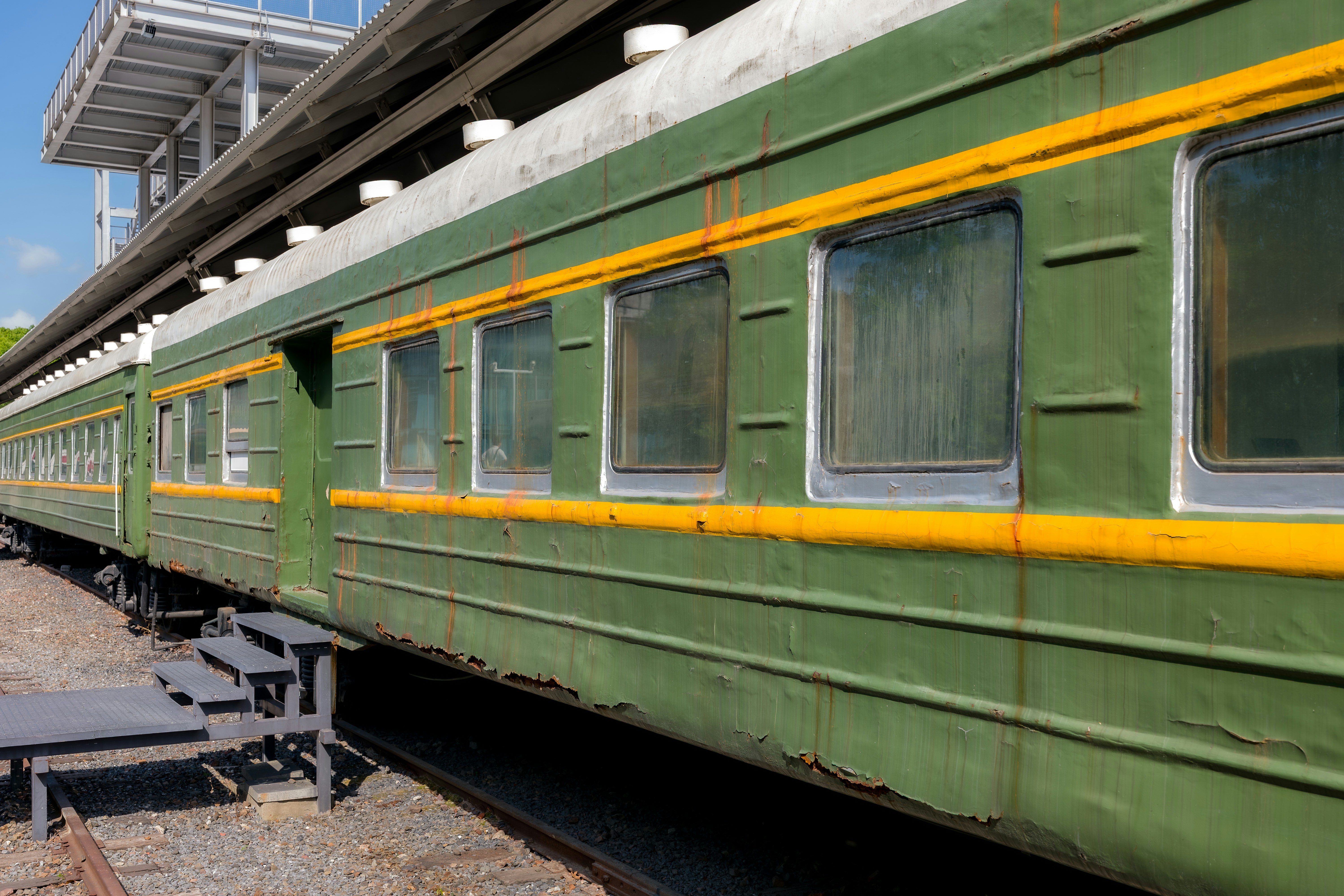 Green Railcar Echoes of the Rusted Line
