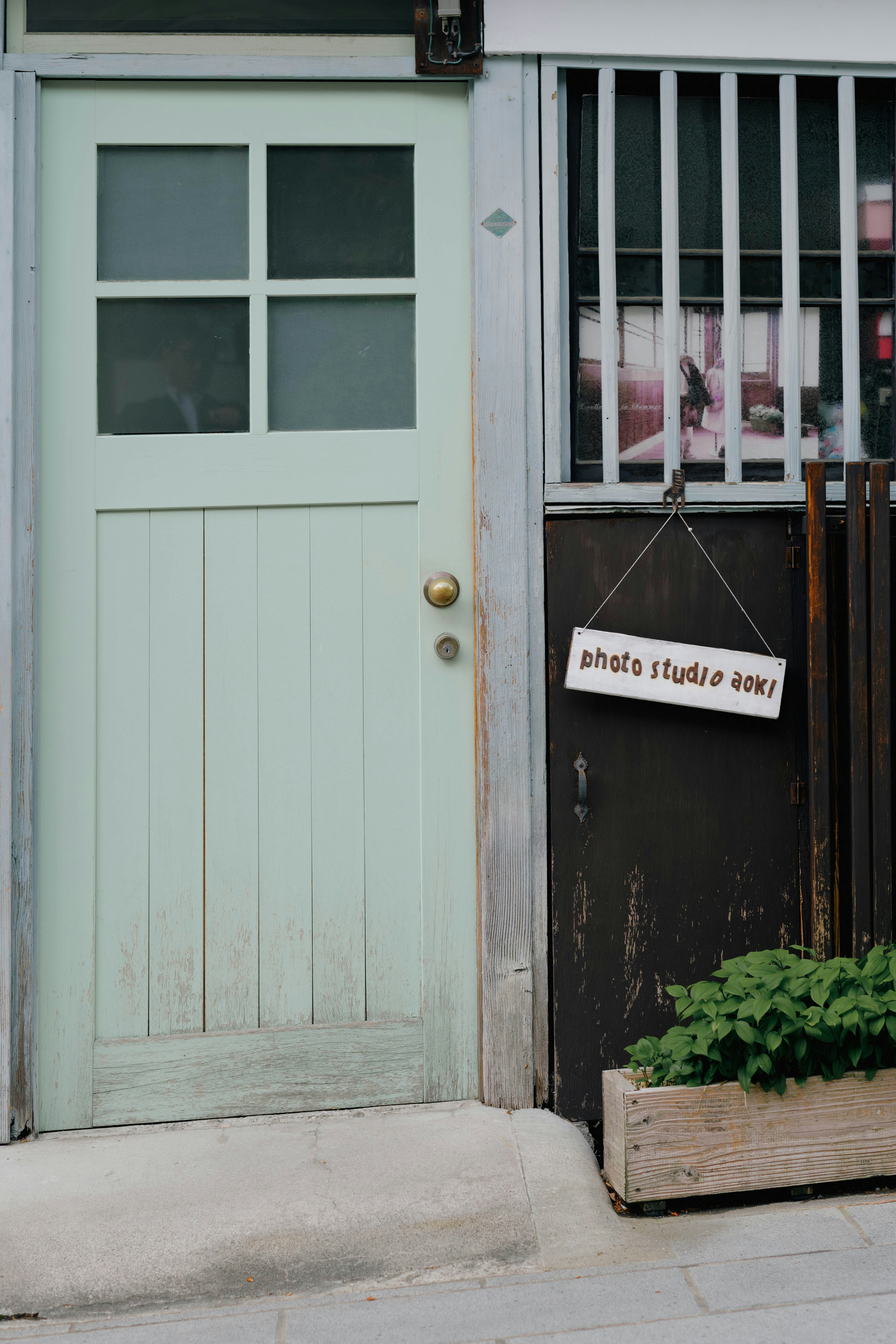 Pastel Doorway and Photo Studio Sign