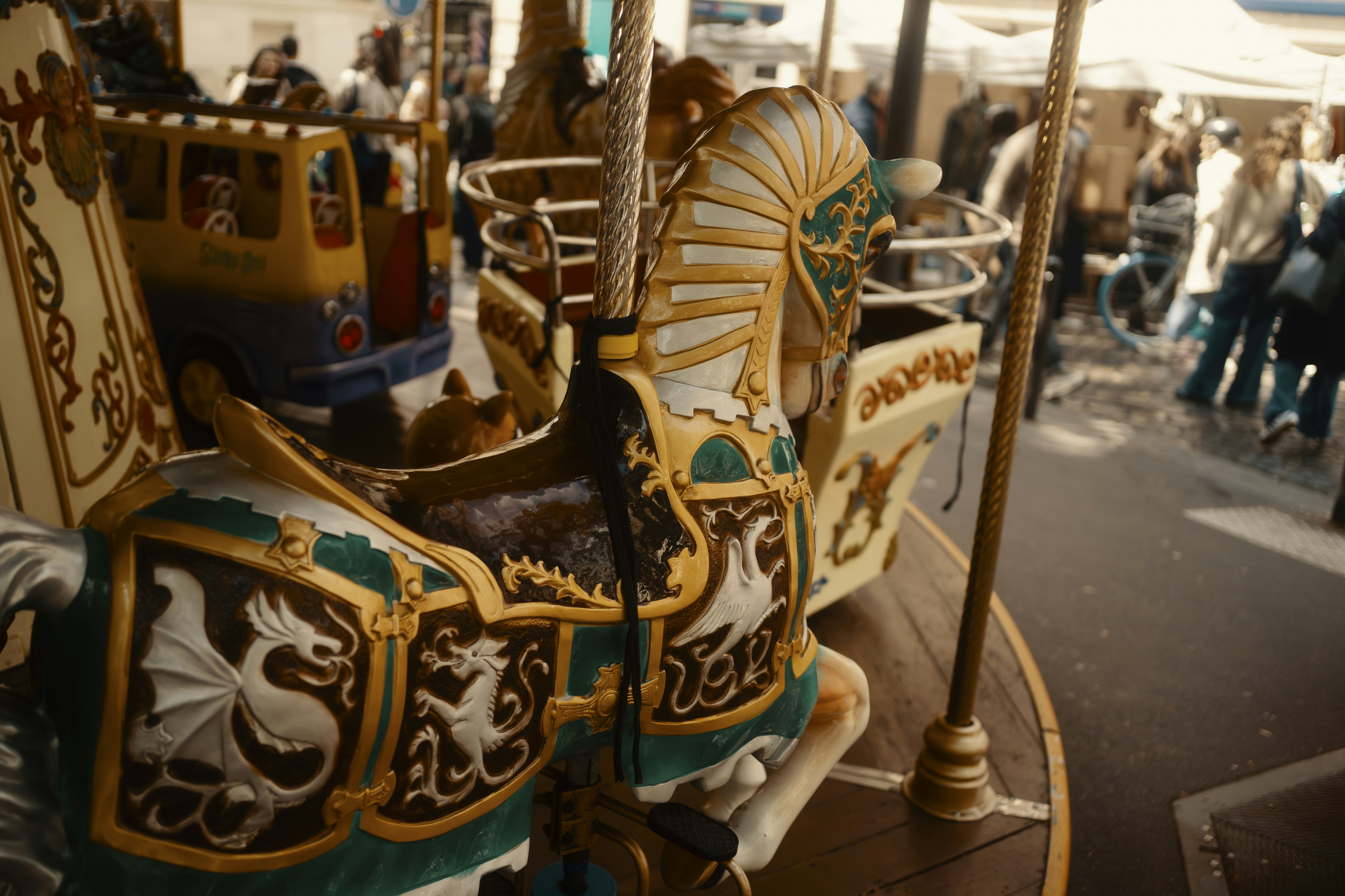 Carousel Horse in Motion: ornate steed under sunlit carnival canopy