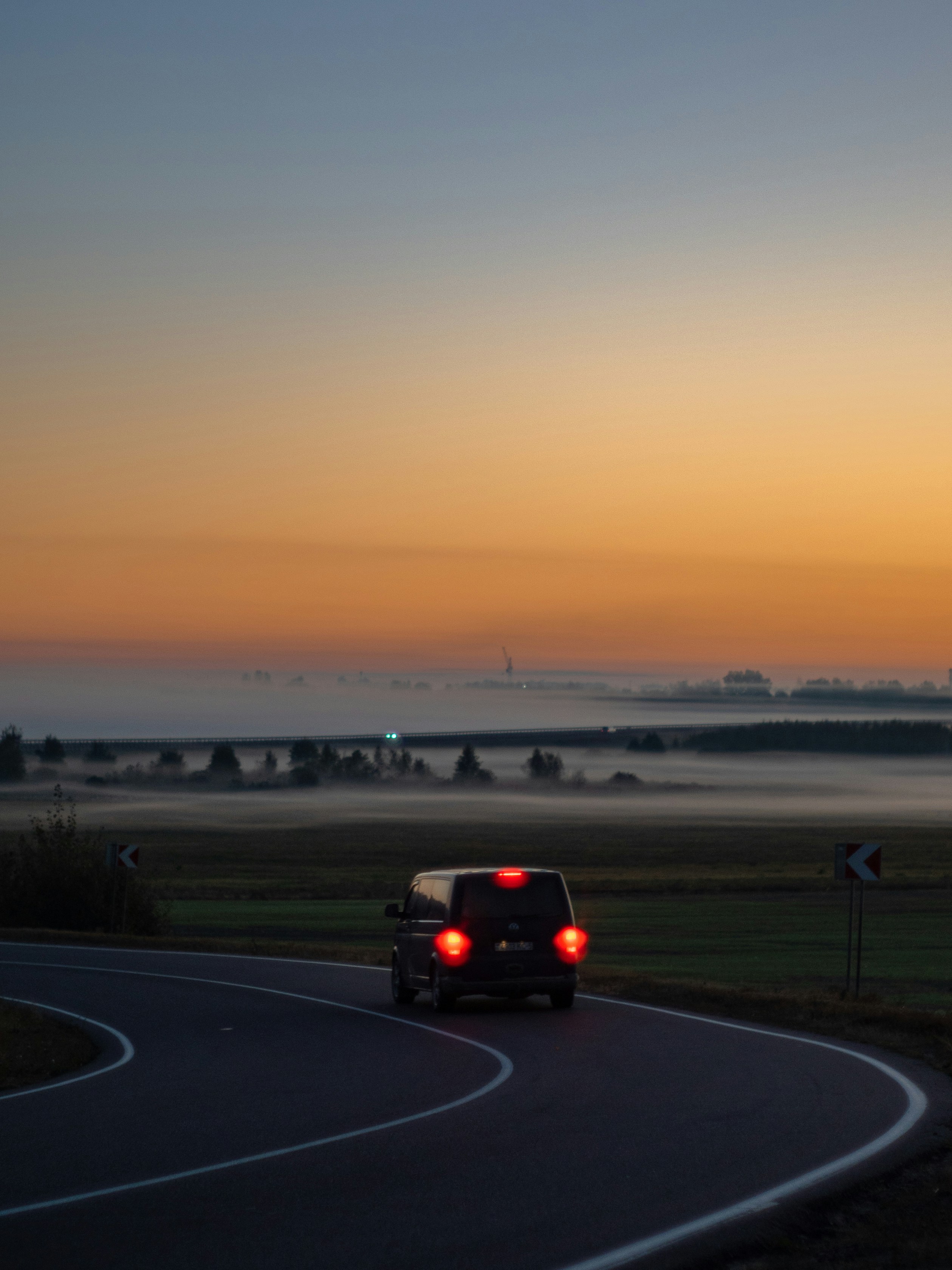 Headlights on the Horizon: A Somber Descent into Evening Curves