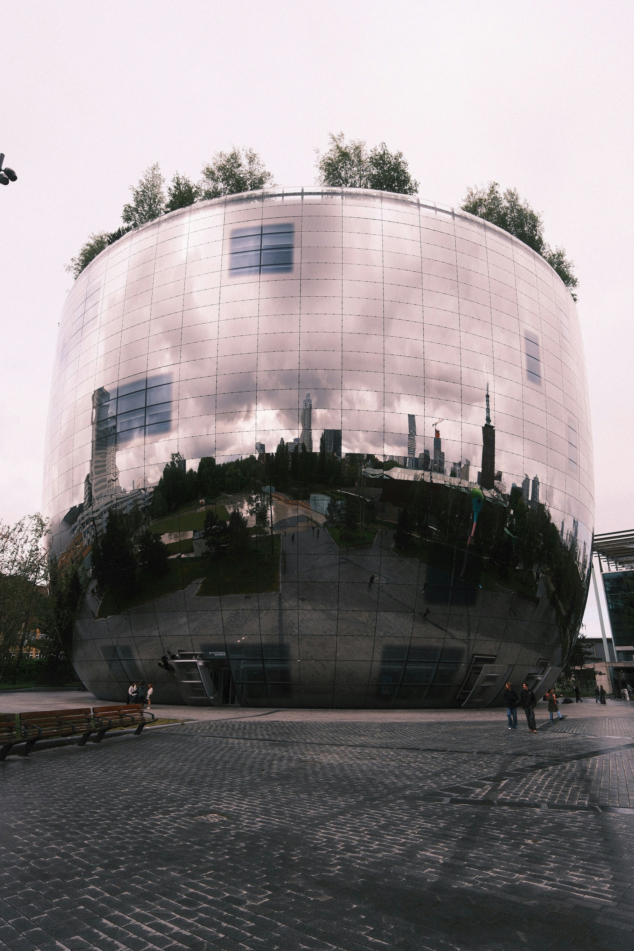Gleaming Sphere Reflecting a Cityscape