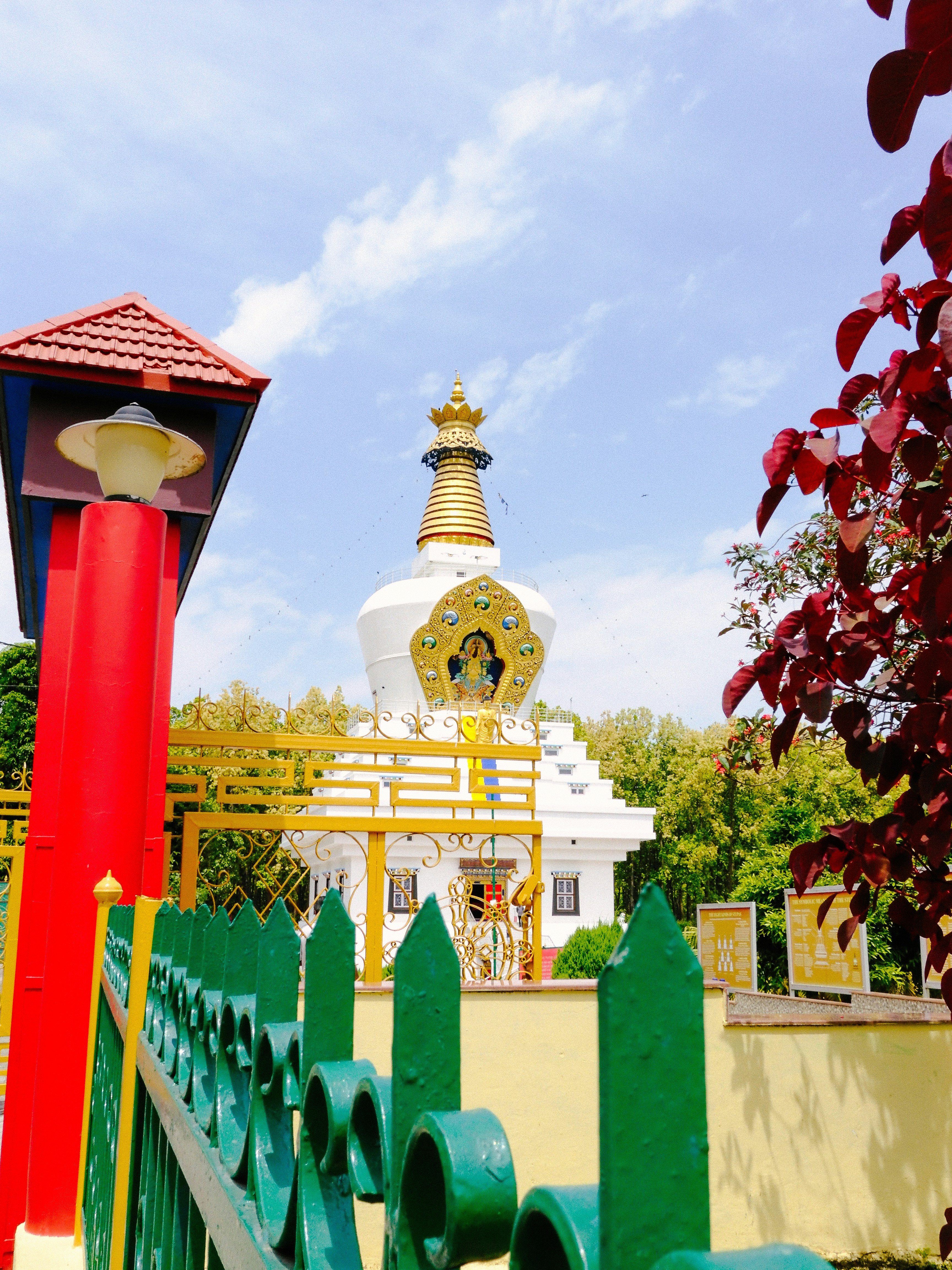Temple in the Sun: Centered Spires and Red Fence