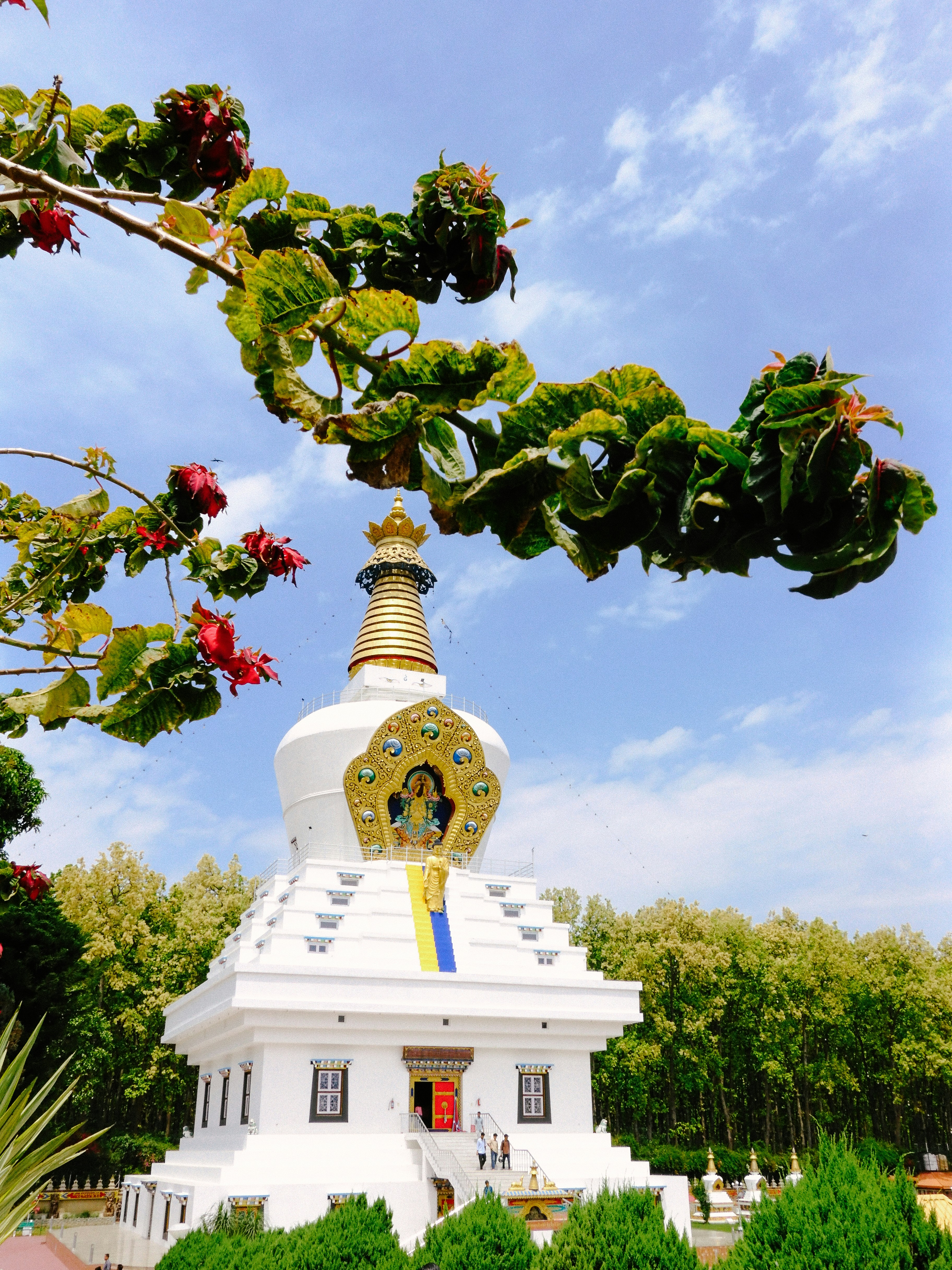 White Pagoda Shrine Reaching Toward a Clear Blue Sky