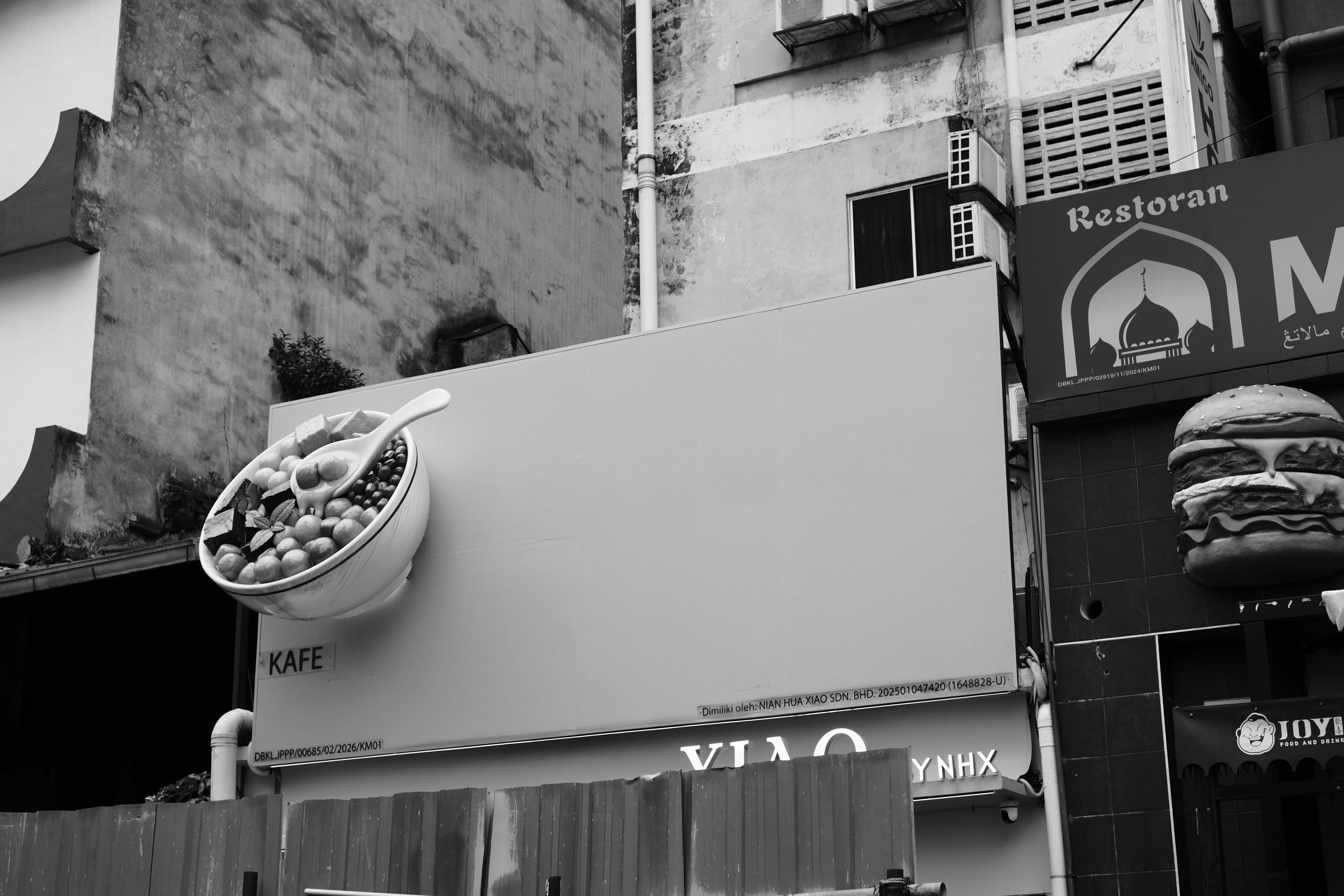 A Retro Diner Sign Framed by Urban Facades